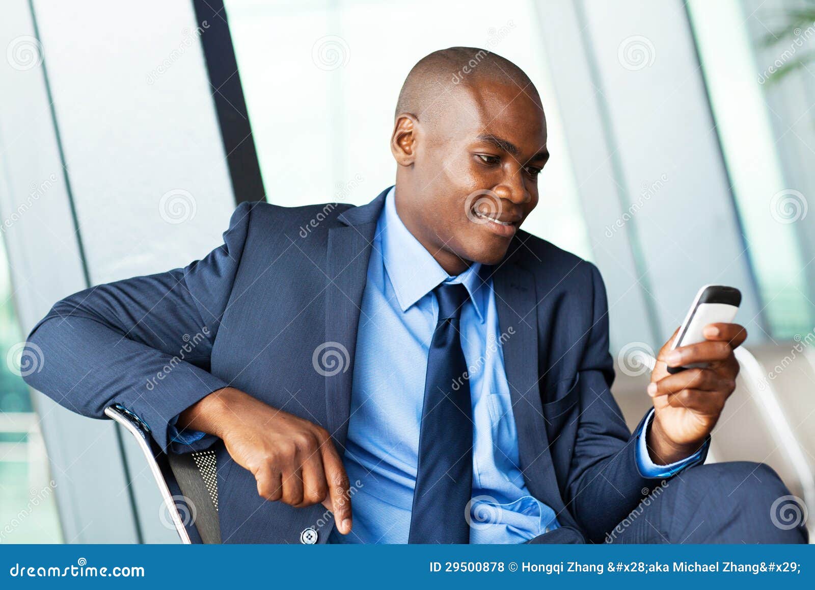 African Businessman Emailing Stock Photo - Image of african, cellphone ...