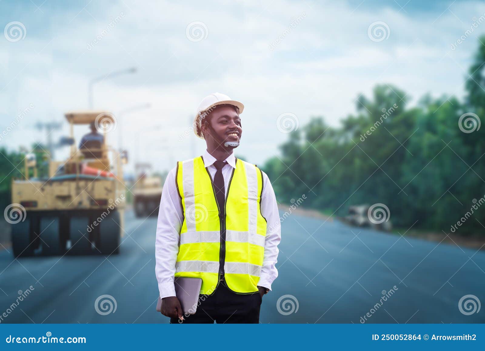 African Civil Engineering Working with Use Tablet for Control the Road ...