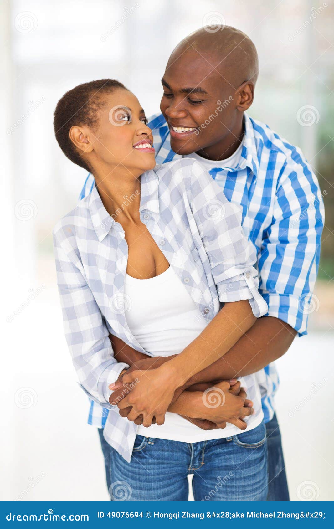 African couple hugging stock photo. Image of boyfriend - 49076694
