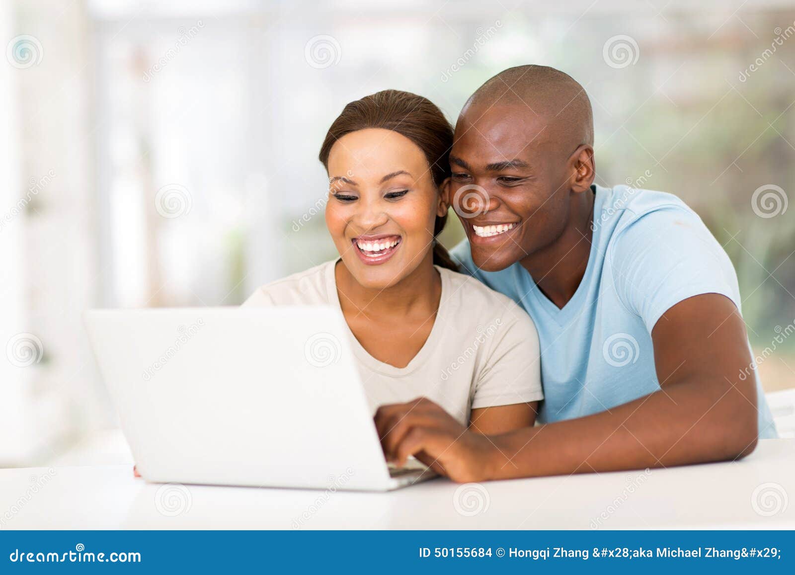 African couple laptop stock photo. Image of indoors, afro - 50155684