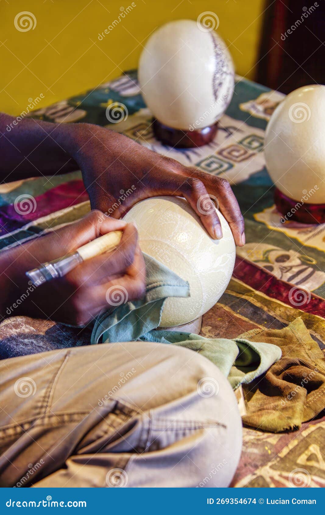 African Craftsman Carving an Ostrich Shell Stock Photo - Image of ...