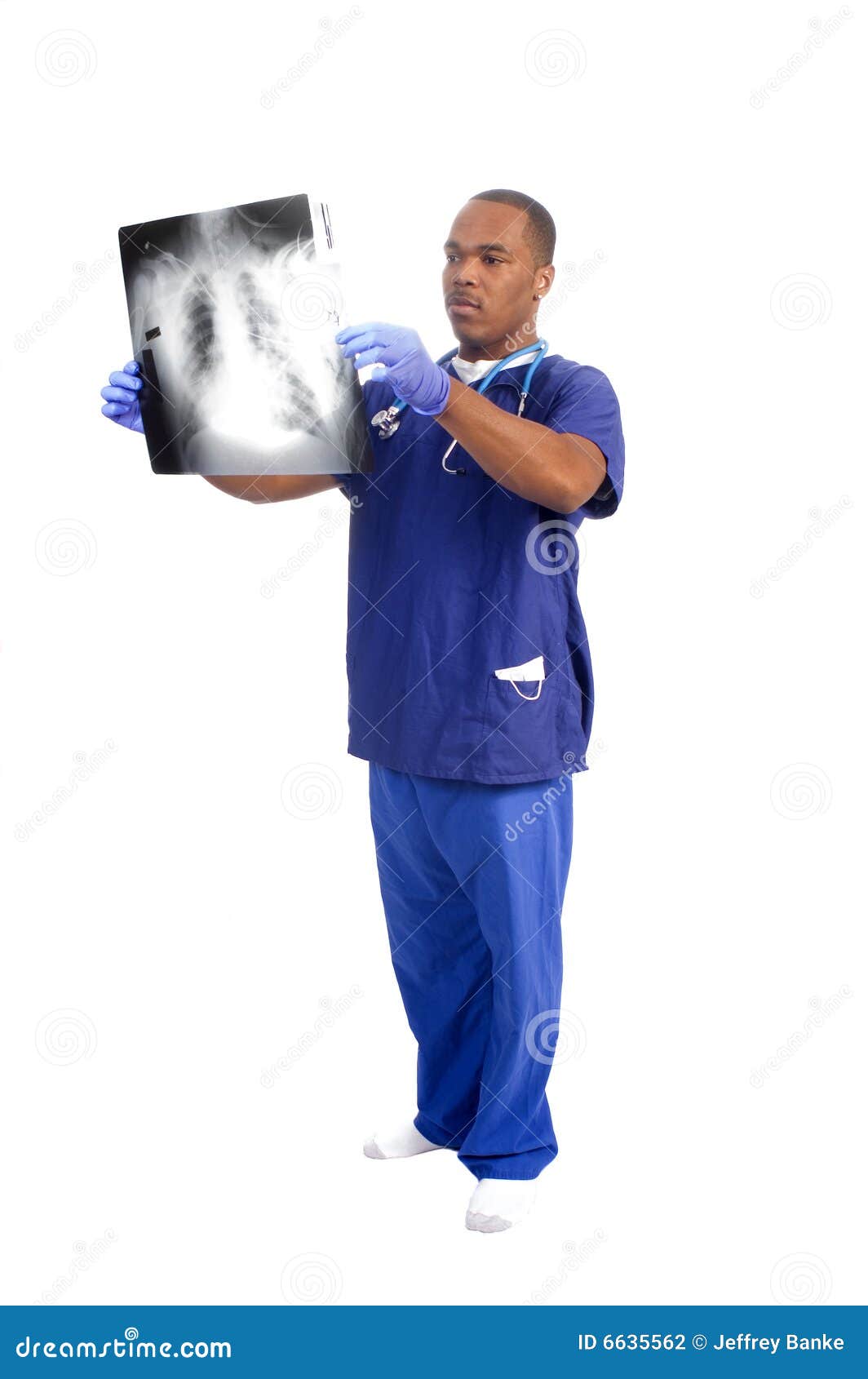 African Doctor Checking X-ray Stock Photo - Image of diagnosing ...