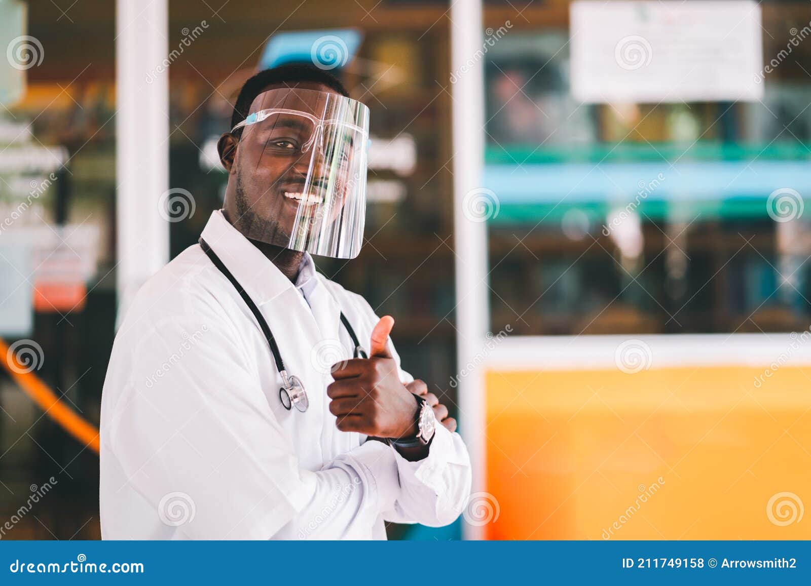 African Doctor Wearing Face Shield with Stethoscope Stock Photo - Image ...