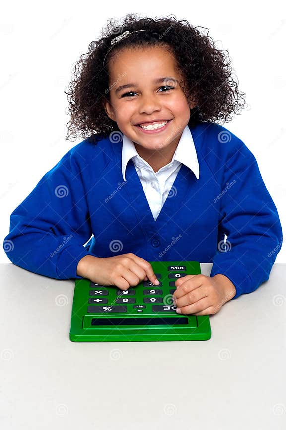 African Elementary School Kid Using a Calculator Stock Image - Image of ...