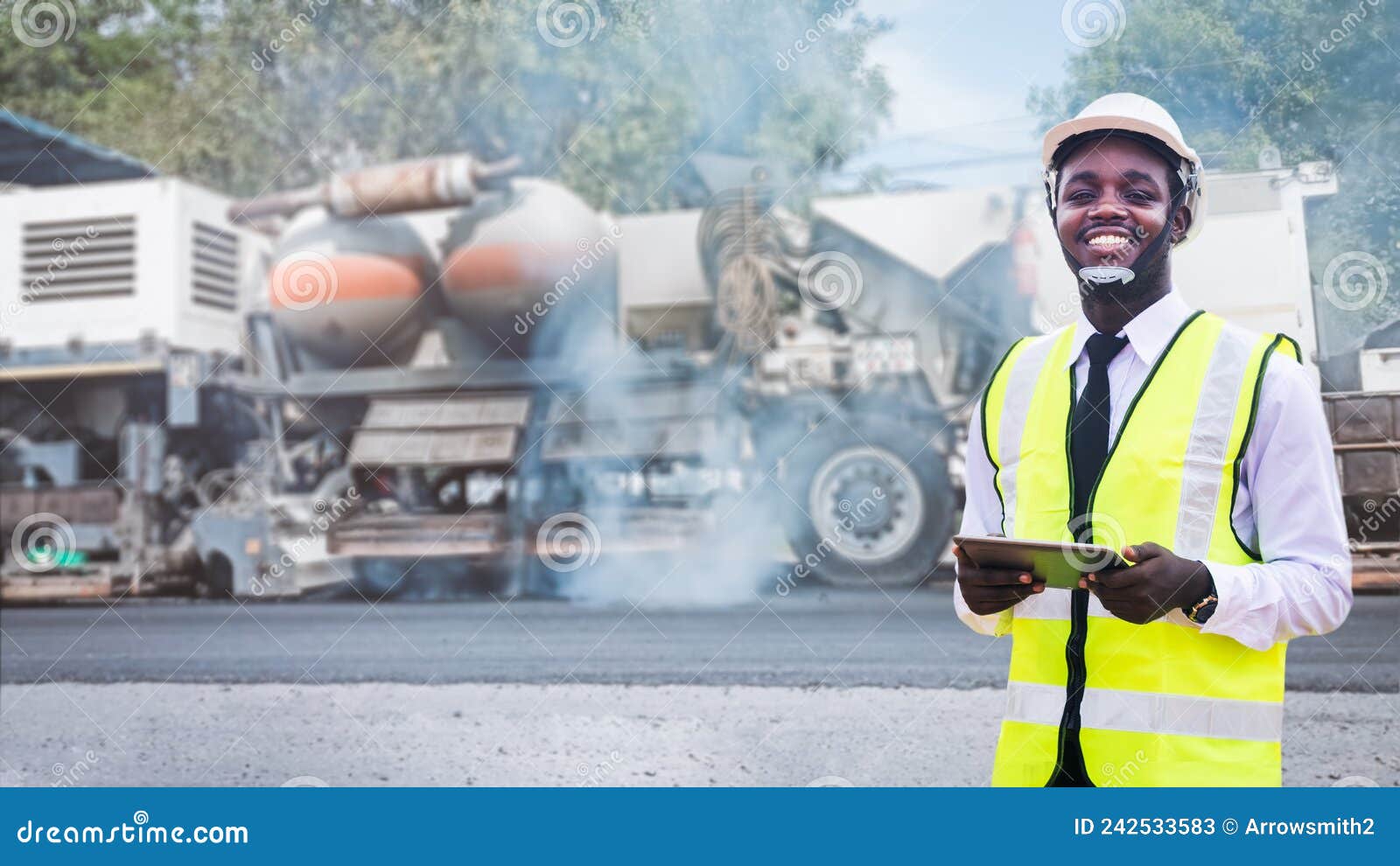 African Engineer Architecture Holding a Tablet for Working on the Road ...