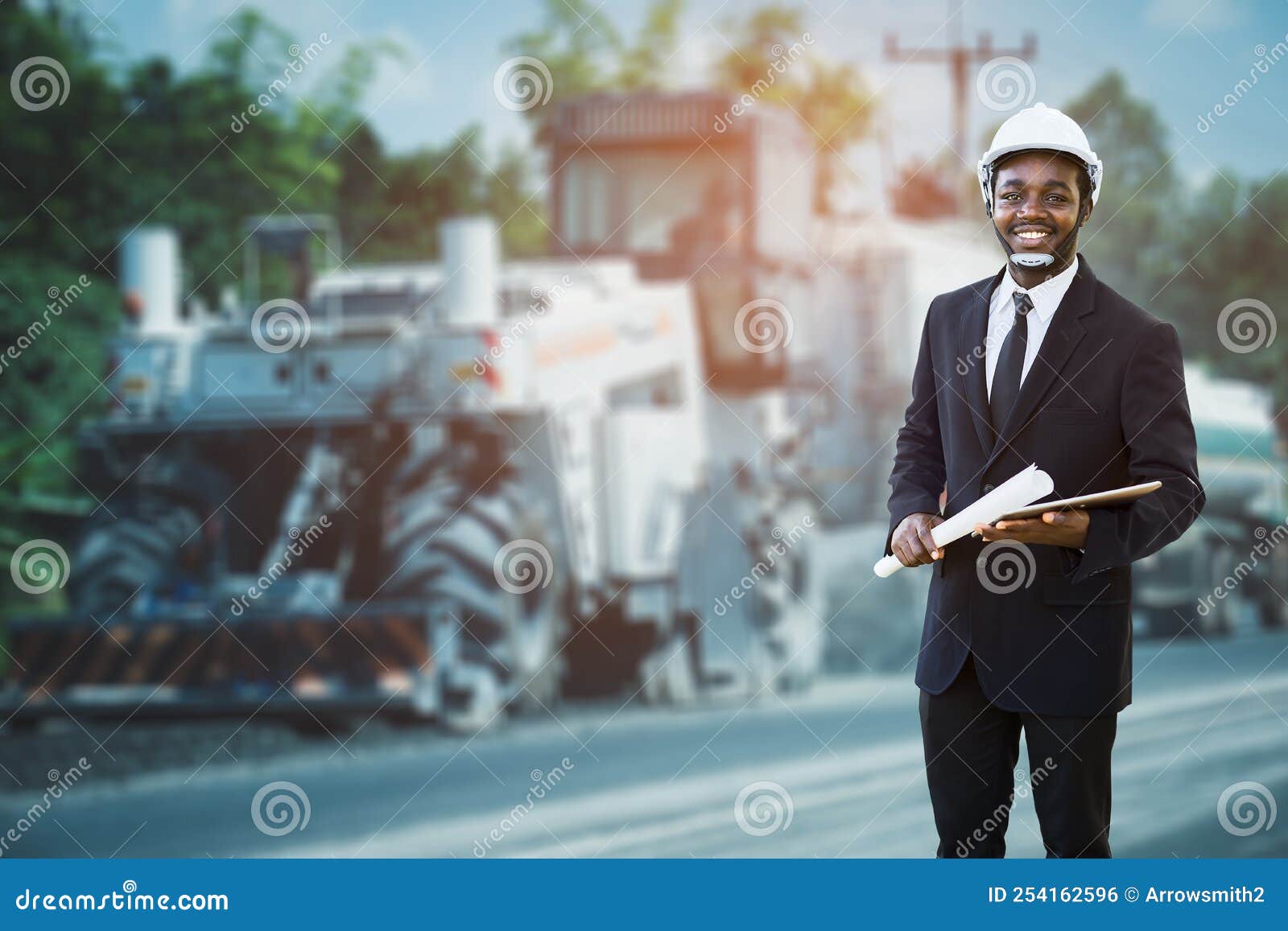 African Engineer Architecture Manager Holding a Tablet for Working on ...