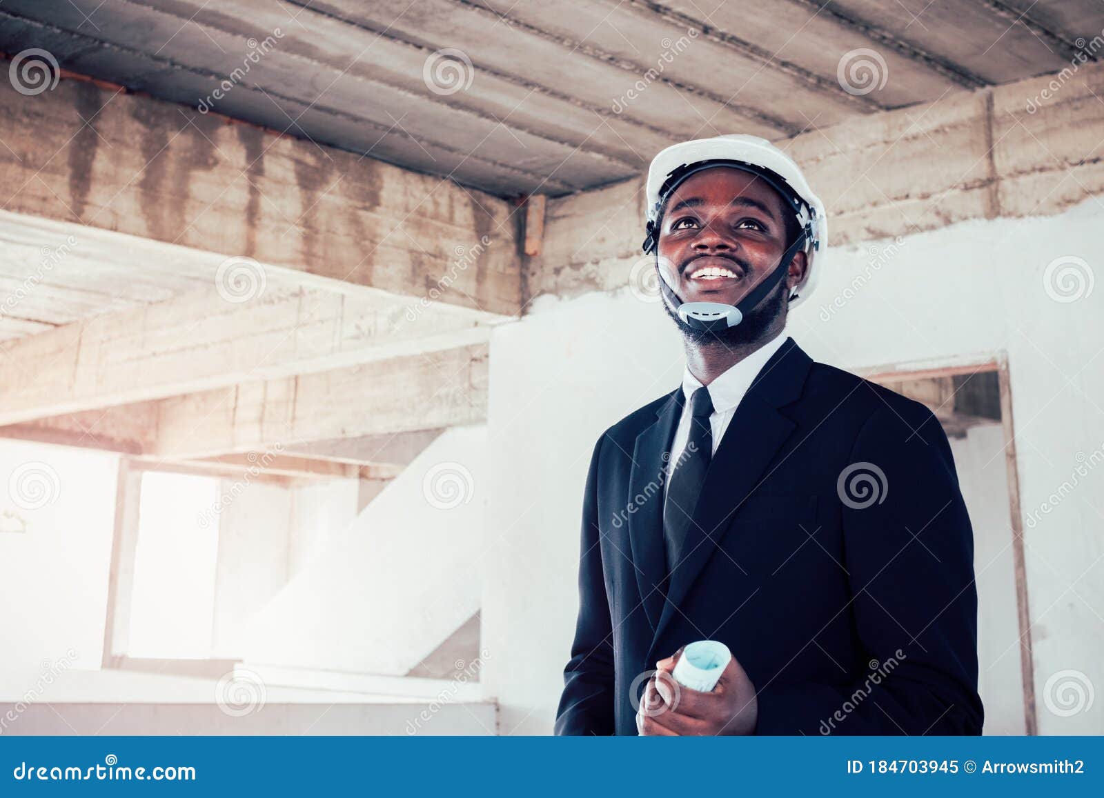 African Engineer Man Architect Looking at Construction Project Stock ...