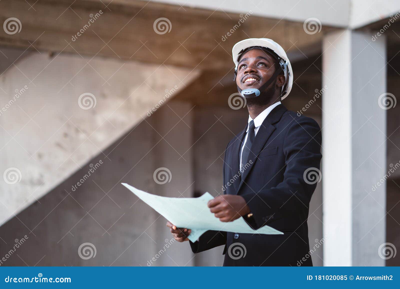 African Engineer Man Stand Up and Looking Upper with Thinking Stock ...