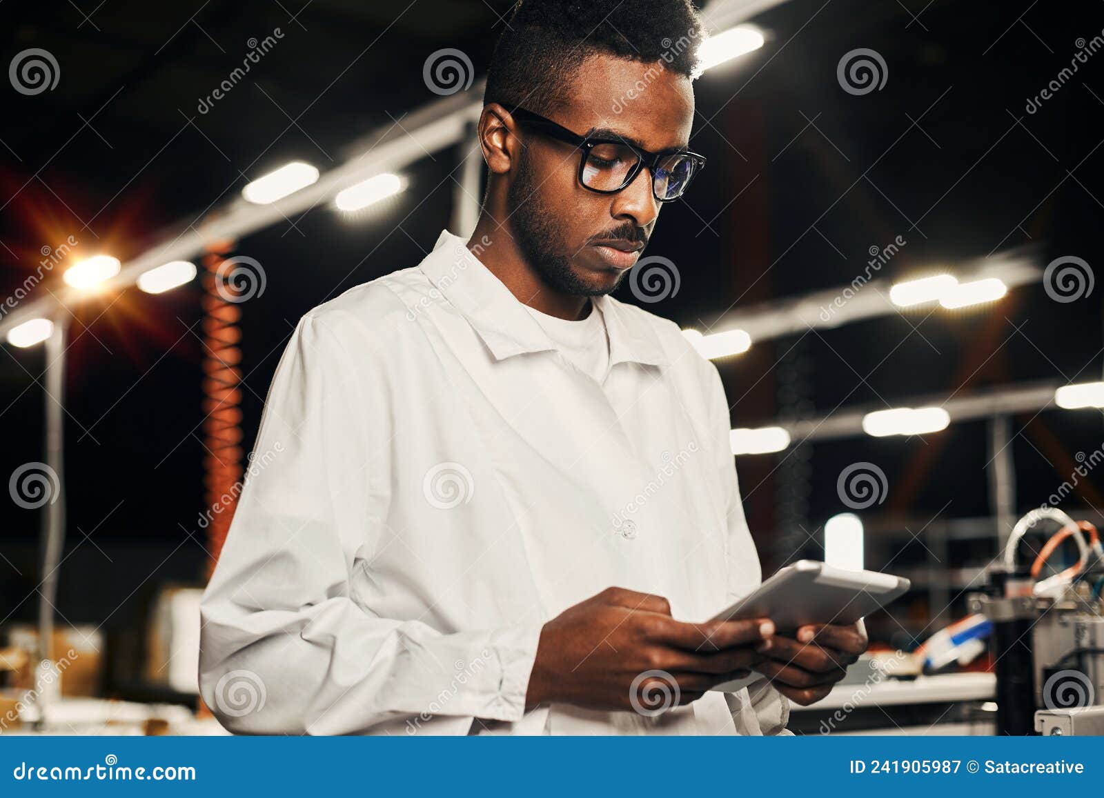 African Engineer Working with Tablet at Factory Stock Image - Image of ...
