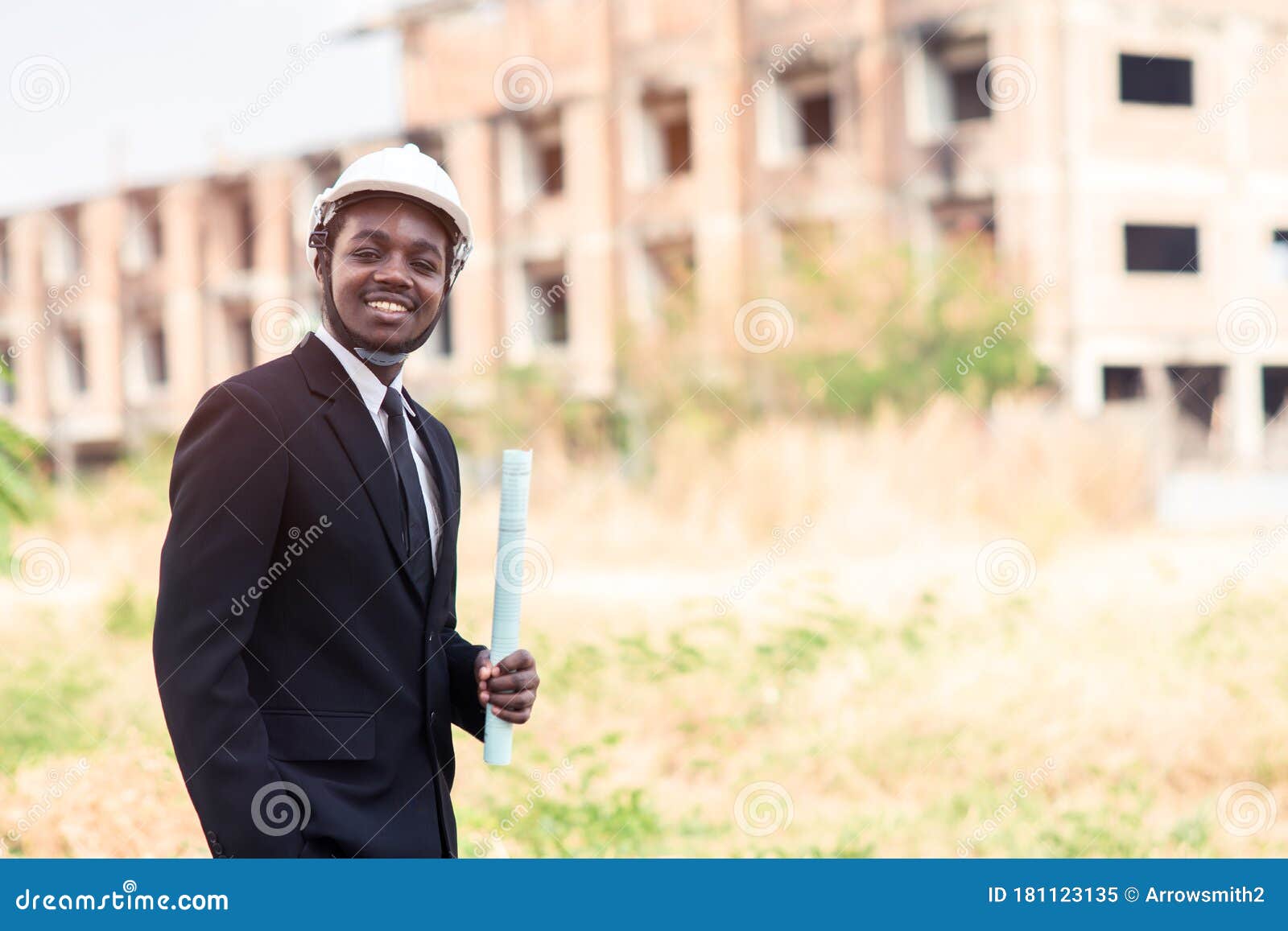 African Engineering Man Smiling with the Building Construction Stock ...
