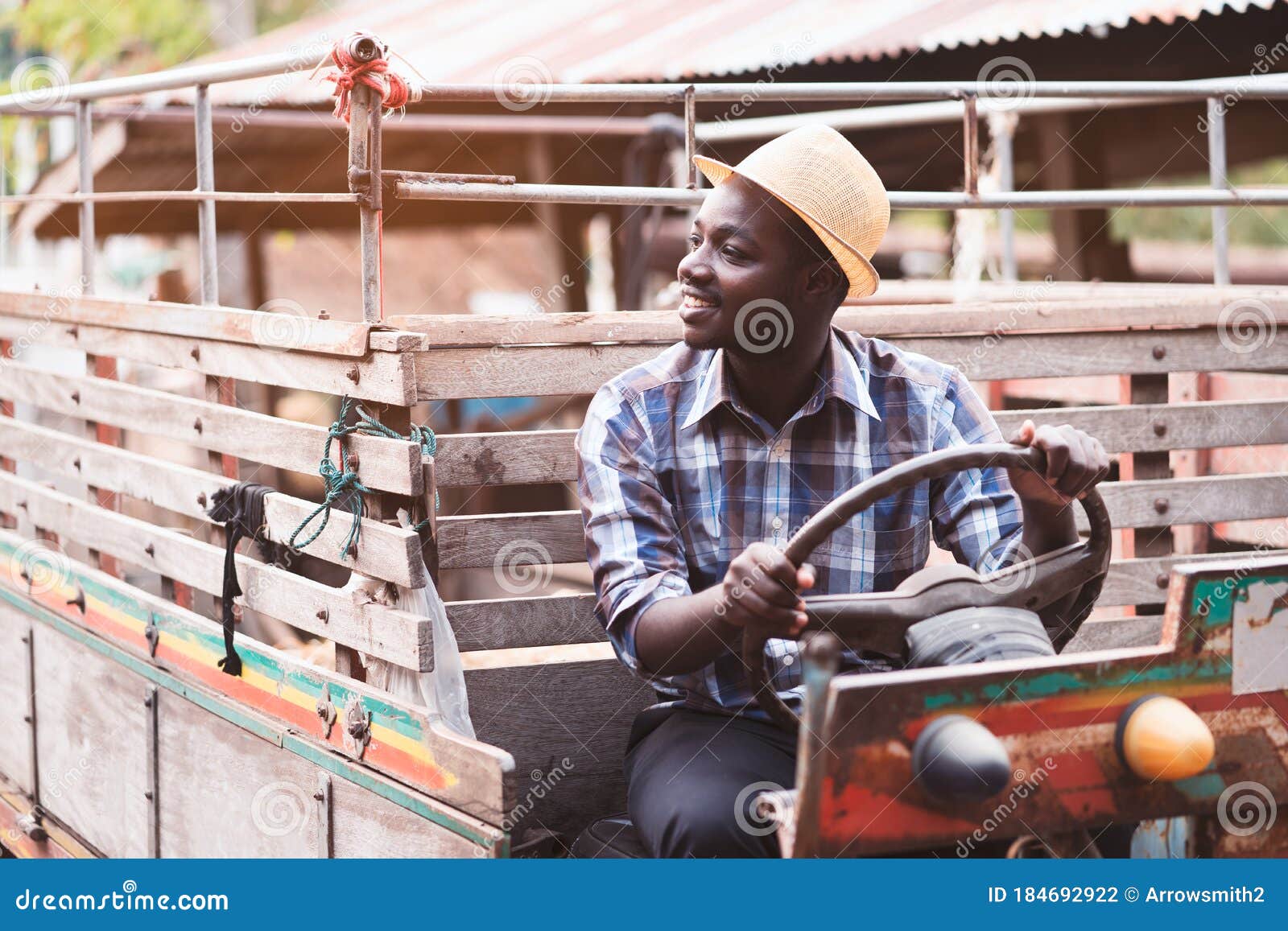 African Farmer Drive Small Tractor on the Countryside Stock Photo ...