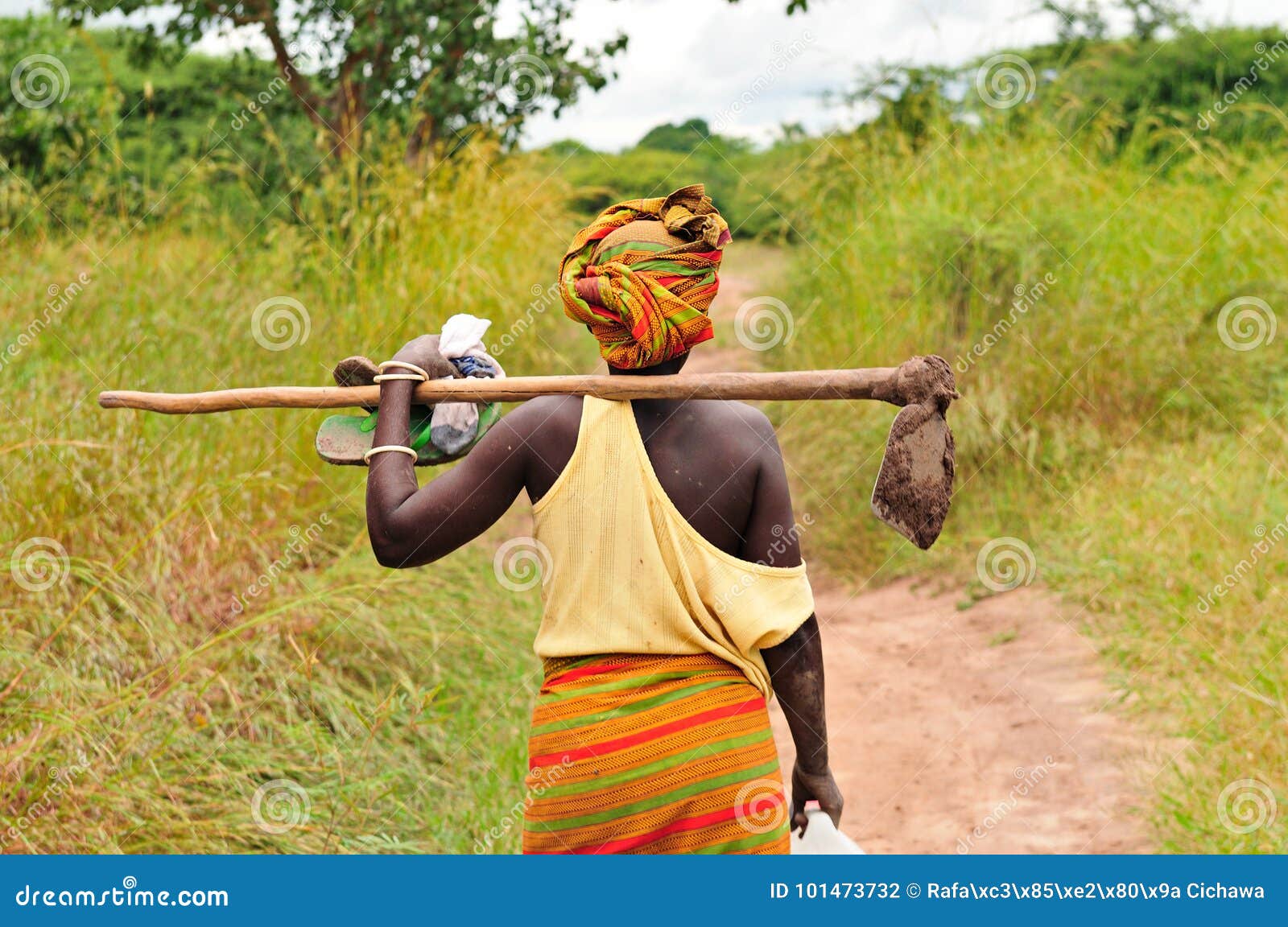 Woman Farmer Wearing Local Thai Tradition Sitting On Her Farm And ...