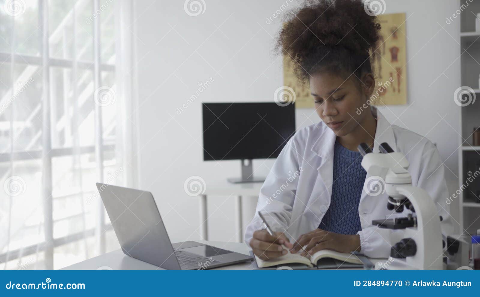 African Female Scientist in Laboratory Doing Experiment in Science Lab ...