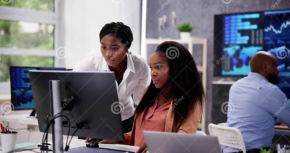 African Financial Data Analysts Using Dashboard on Screens Stock Image ...