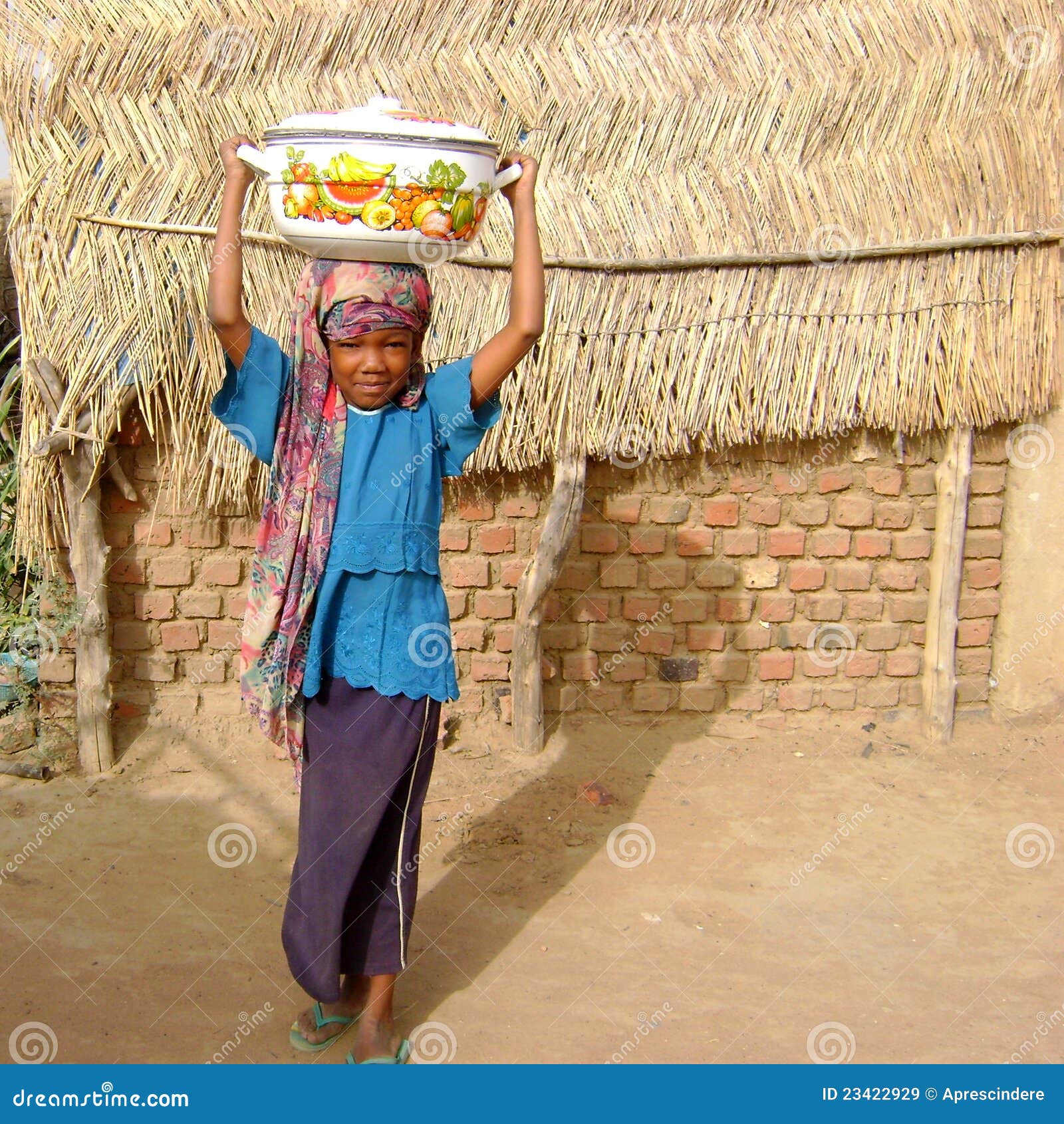 An African Girl Walking Long Distance To Fetch Water In Buckets ...