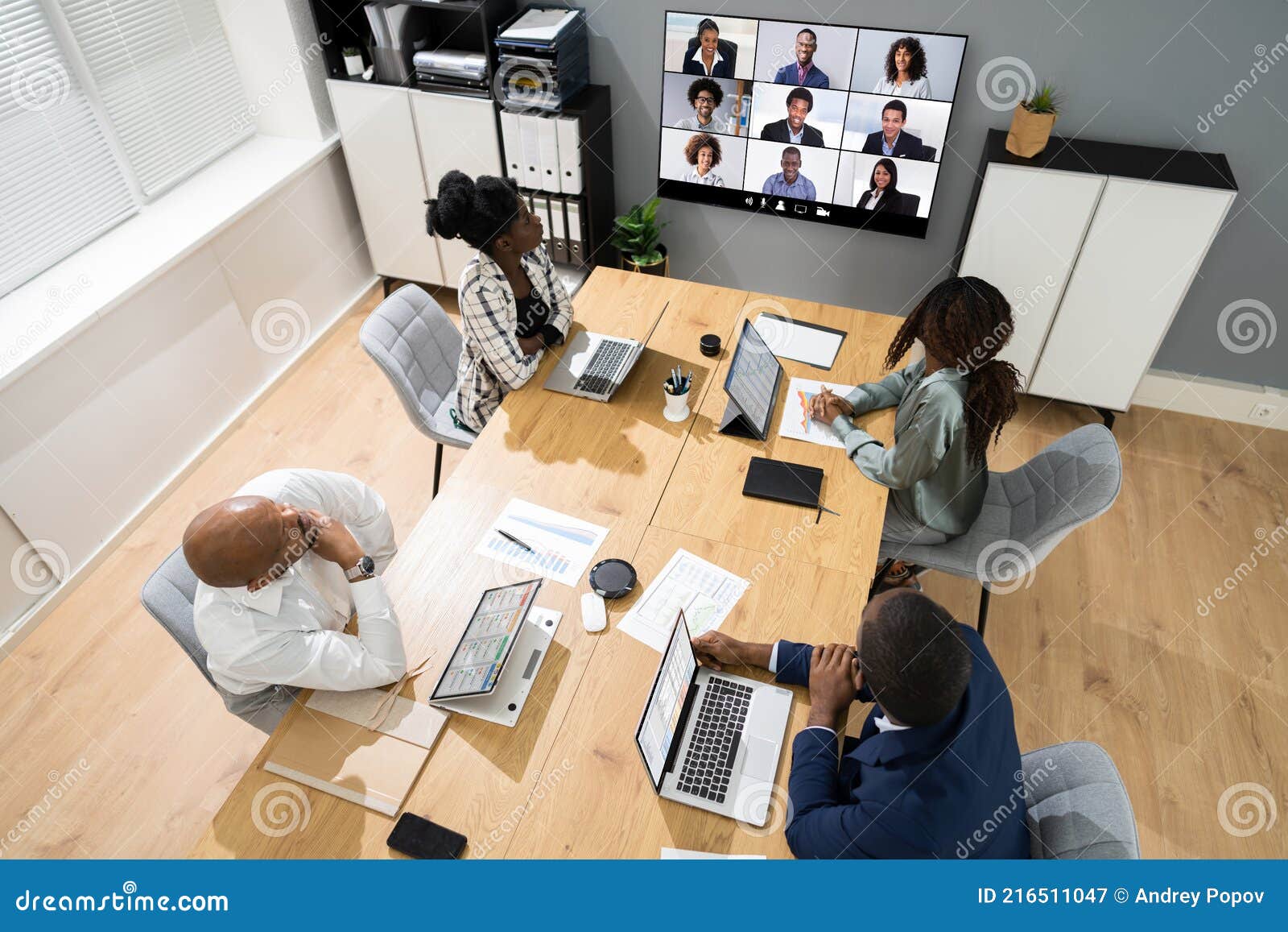 African Group on Screen stock image. Image of cooperation - 216511047
