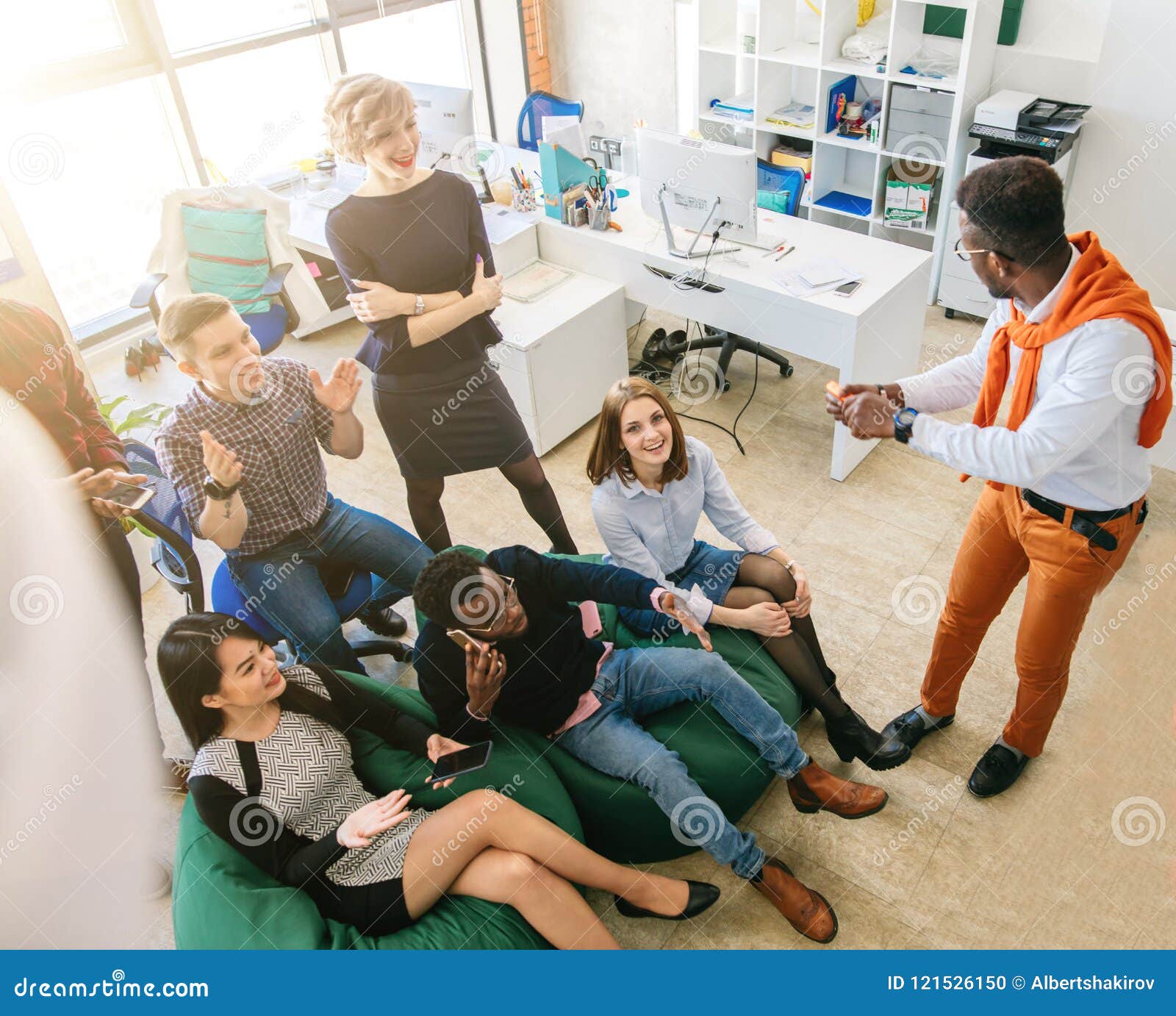 African Guy is Having a Conversation on Cell Phone in the Break of ...