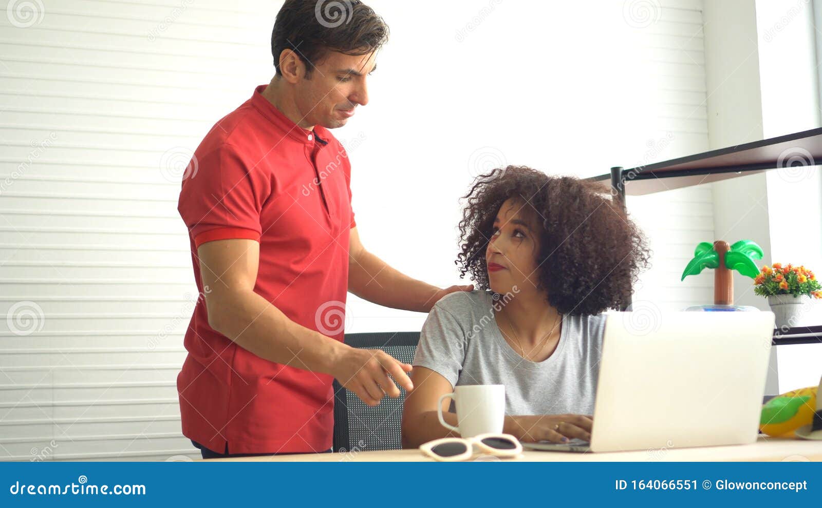 African and Hispanic Couple Supporting Each Other at Freelance Work from Home Stock Image ...