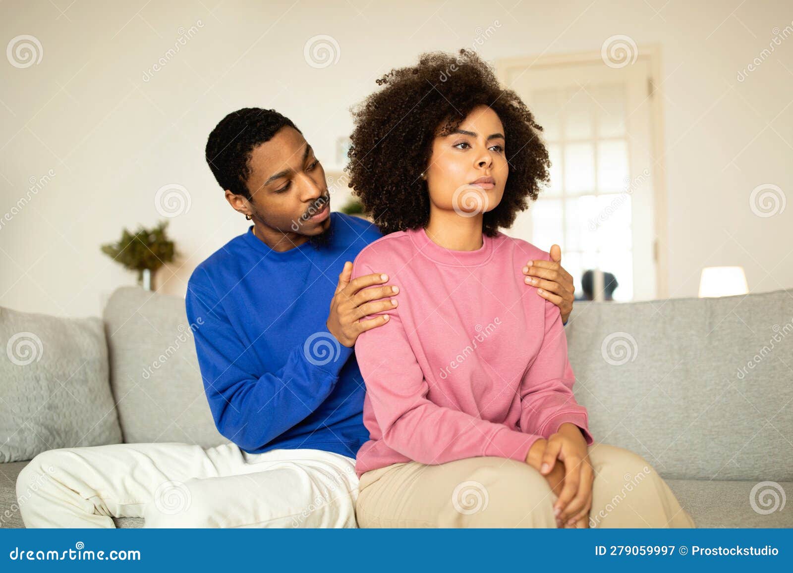 African Husband Apologizing After Quarrel Touching Wife S Shoulders At