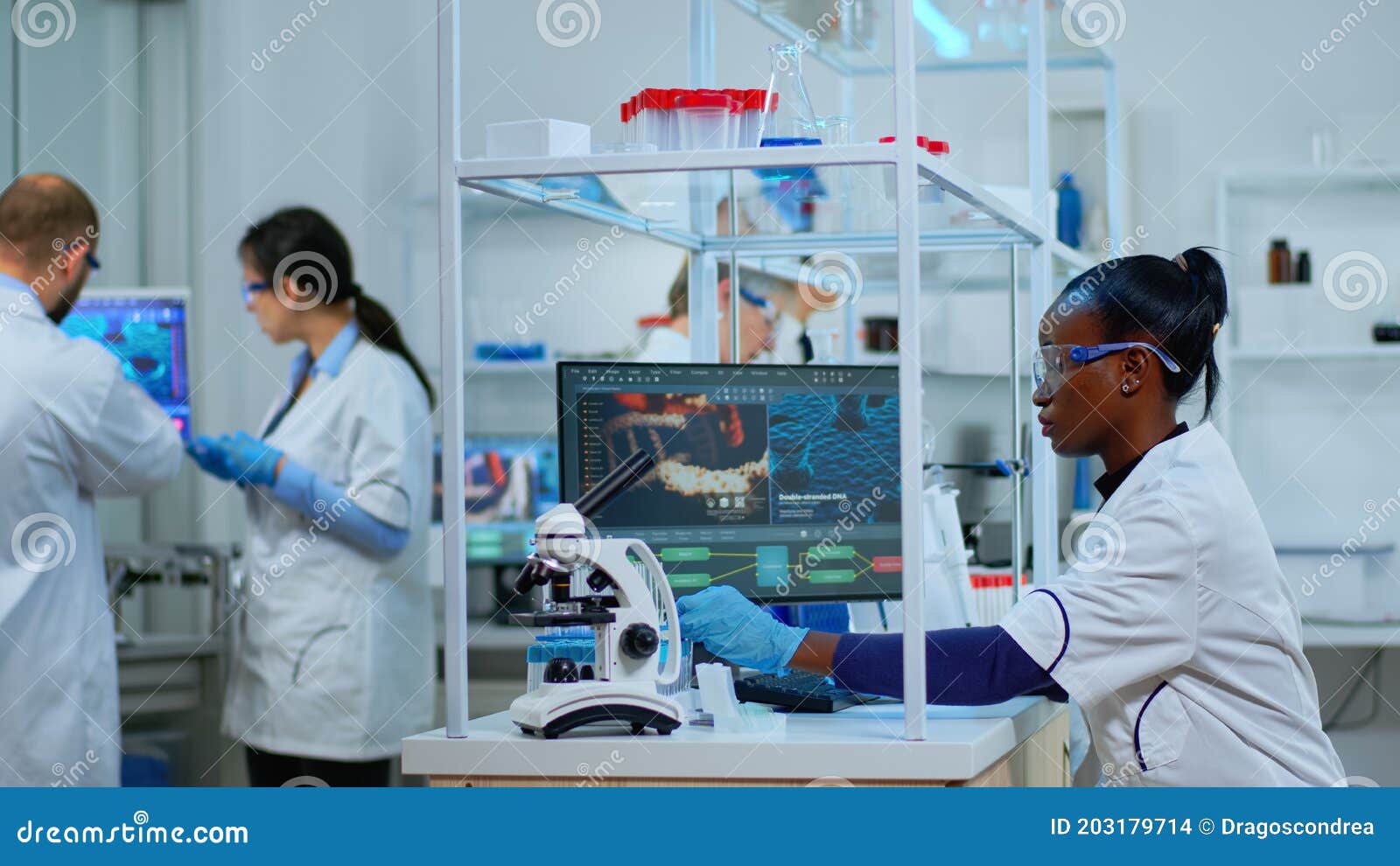 African Laboratory Scientist Working at Lab with Test Tubes Stock Photo ...