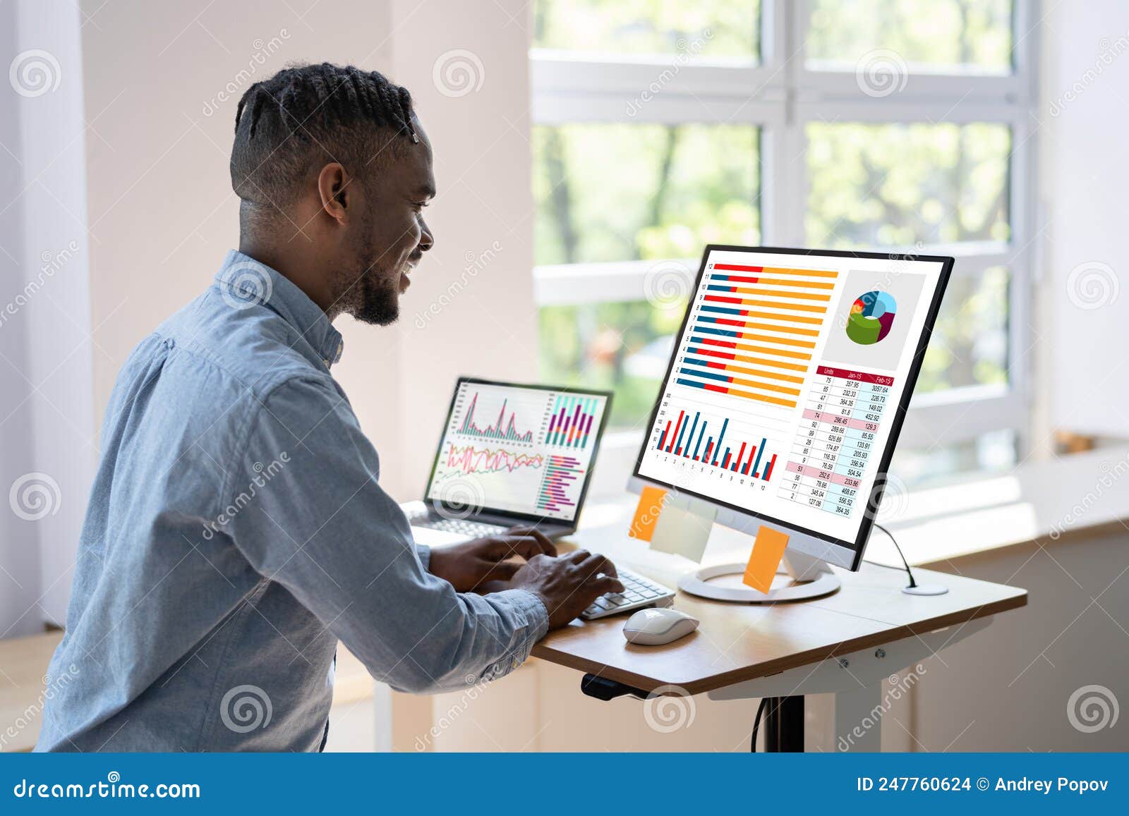 African Male Using Data Analytics Stock Photo - Image of world, screens ...