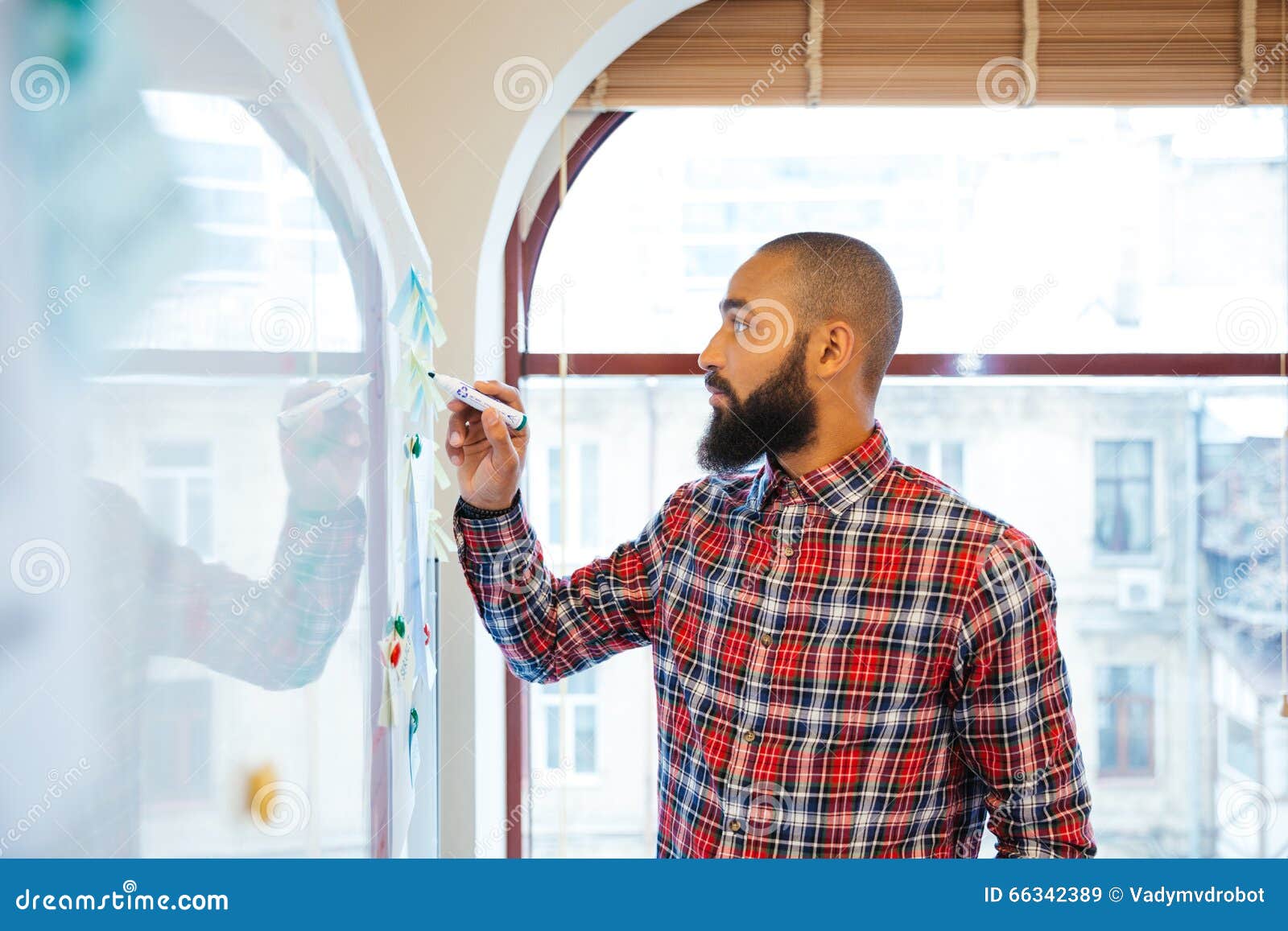 African Man with Beard Standing and Writing on Whiteboard Stock Image ...