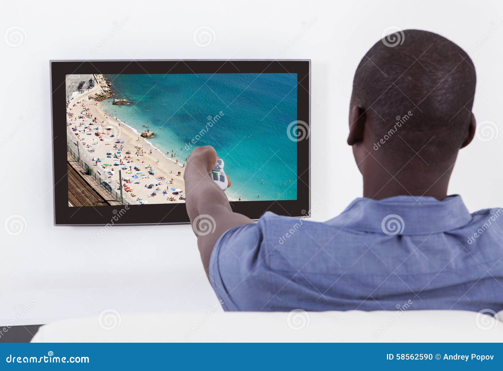 African Man Changing Channel Stock Photos - Free & Royalty-Free Stock ...