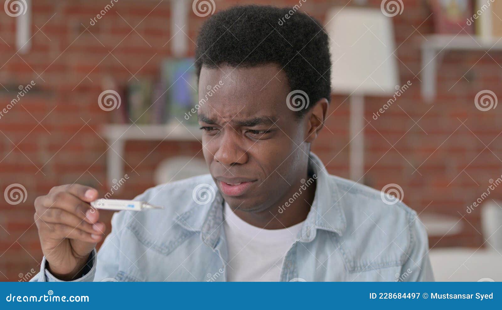 African Man Checking Temperature with Thermometer Stock Image - Image ...