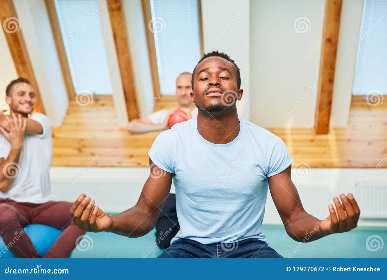 African Man is Doing Breathing Exercise while Doing Yoga Stock Photo ...