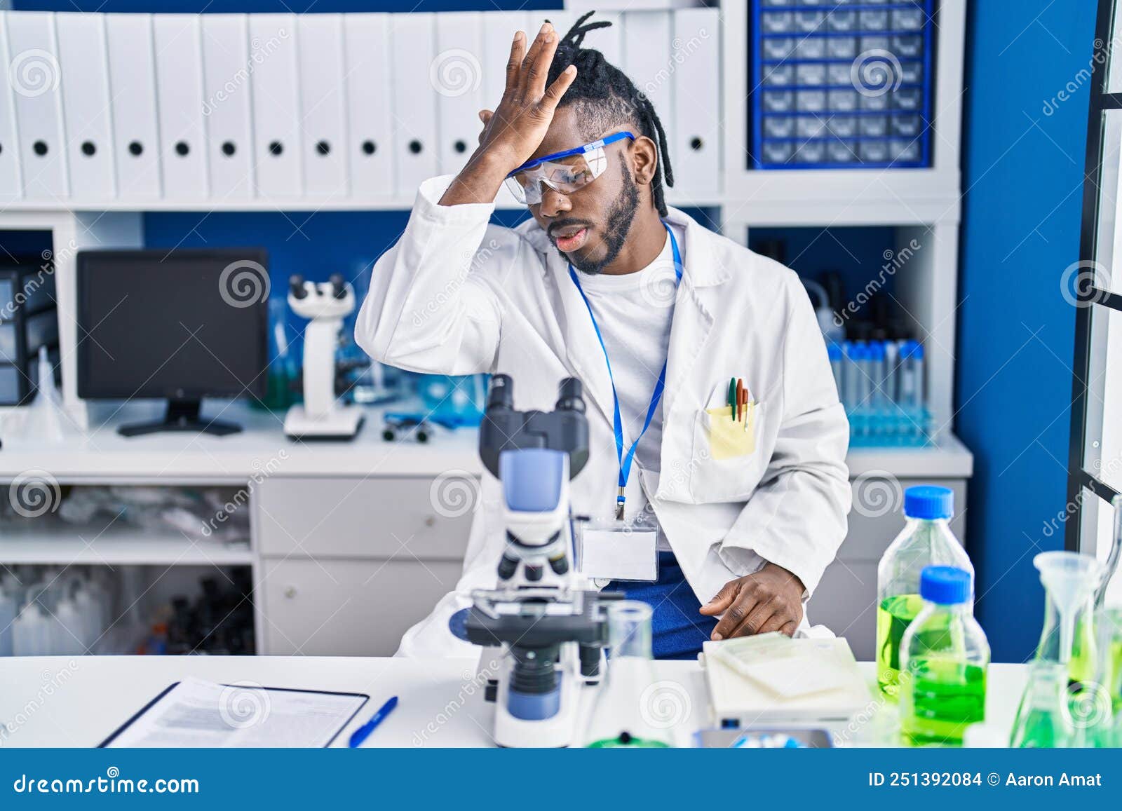 African Man with Dreadlocks Working at Scientist Laboratory Surprised ...