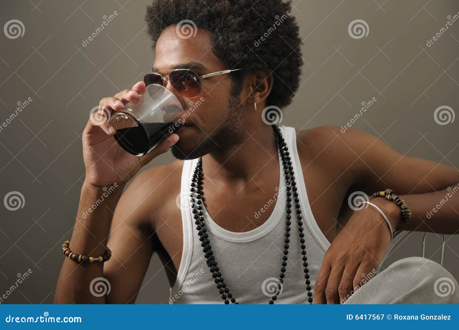 African man drinking stock image. Image of exotic, adult - 6417567
