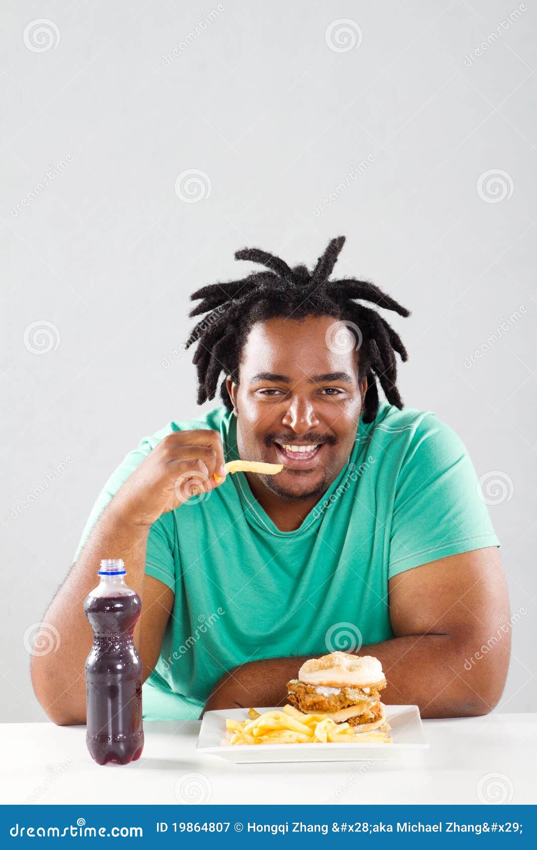African man eating chips stock image. Image of cheerful - 19864807