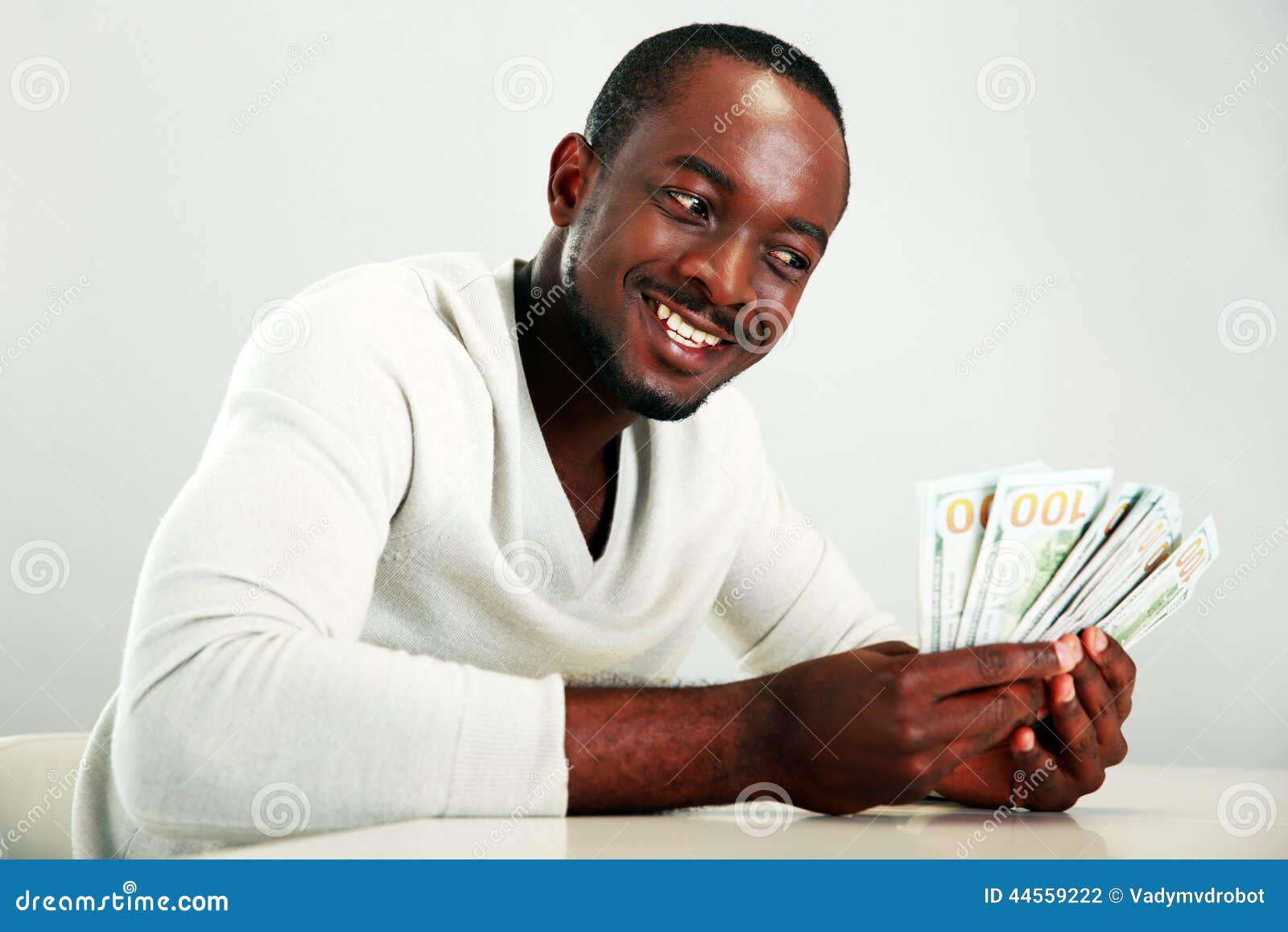 African Man Holding US Dollars Stock Photo - Image of handsome, bank ...