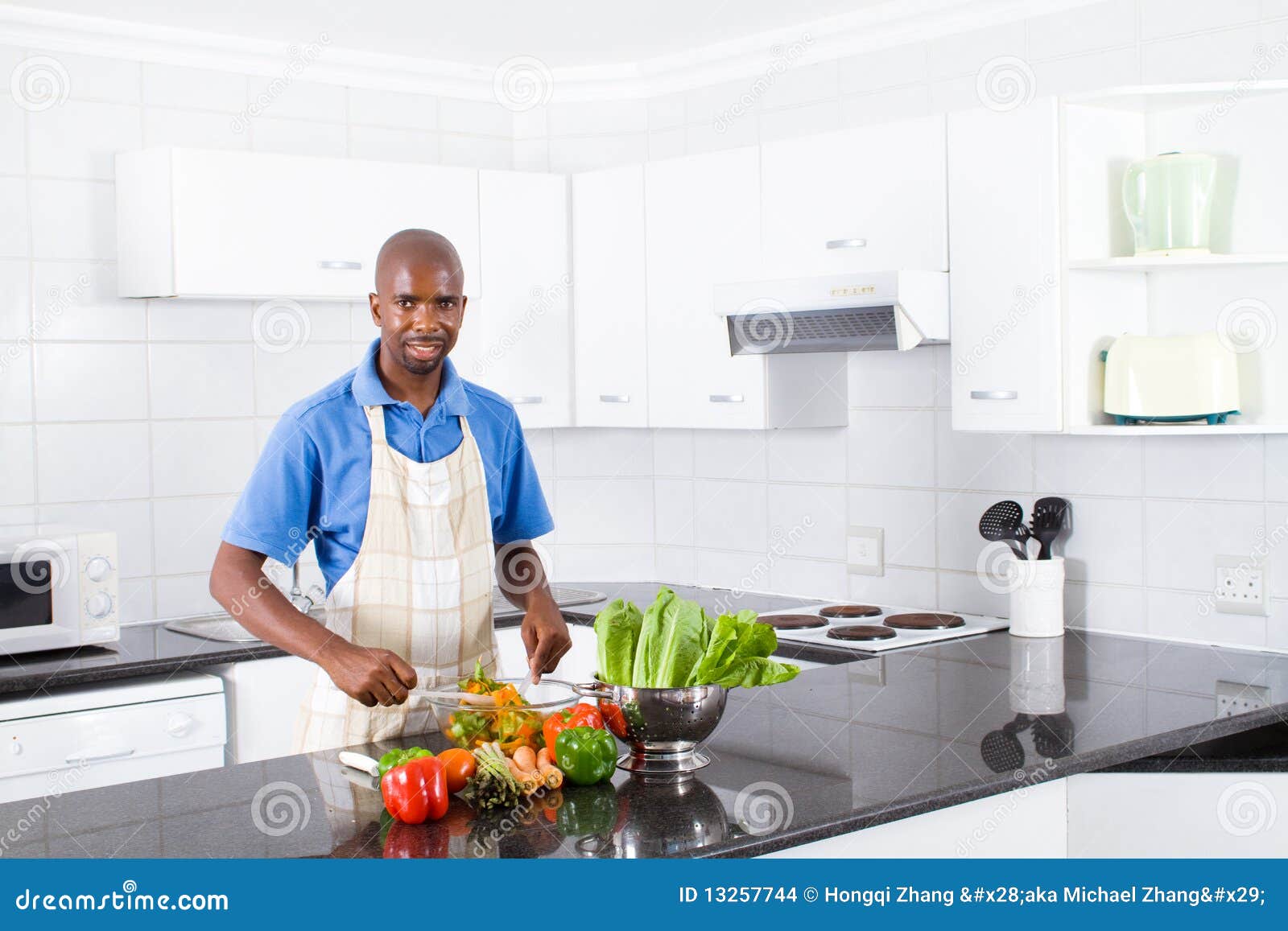 African man in kitchen stock photo. Image of cookery - 13257744