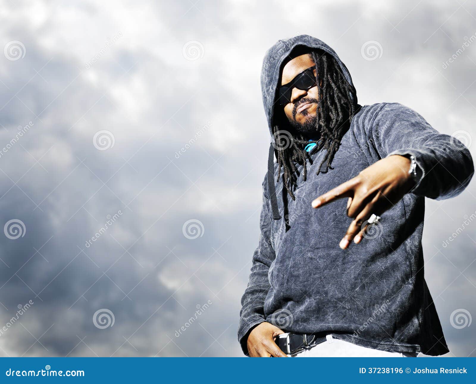 African Man Making Peace Sign. Stock Photo - Image of dramatic, outside ...