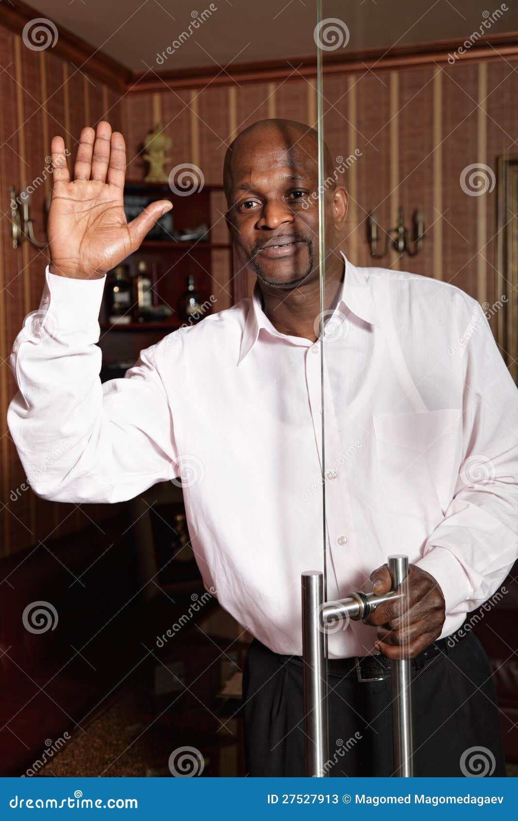 African Man Raising Hand in Greeting Stock Image - Image of raising ... African Man Raising Hand in Greeting Stock Image - Image of raising ...