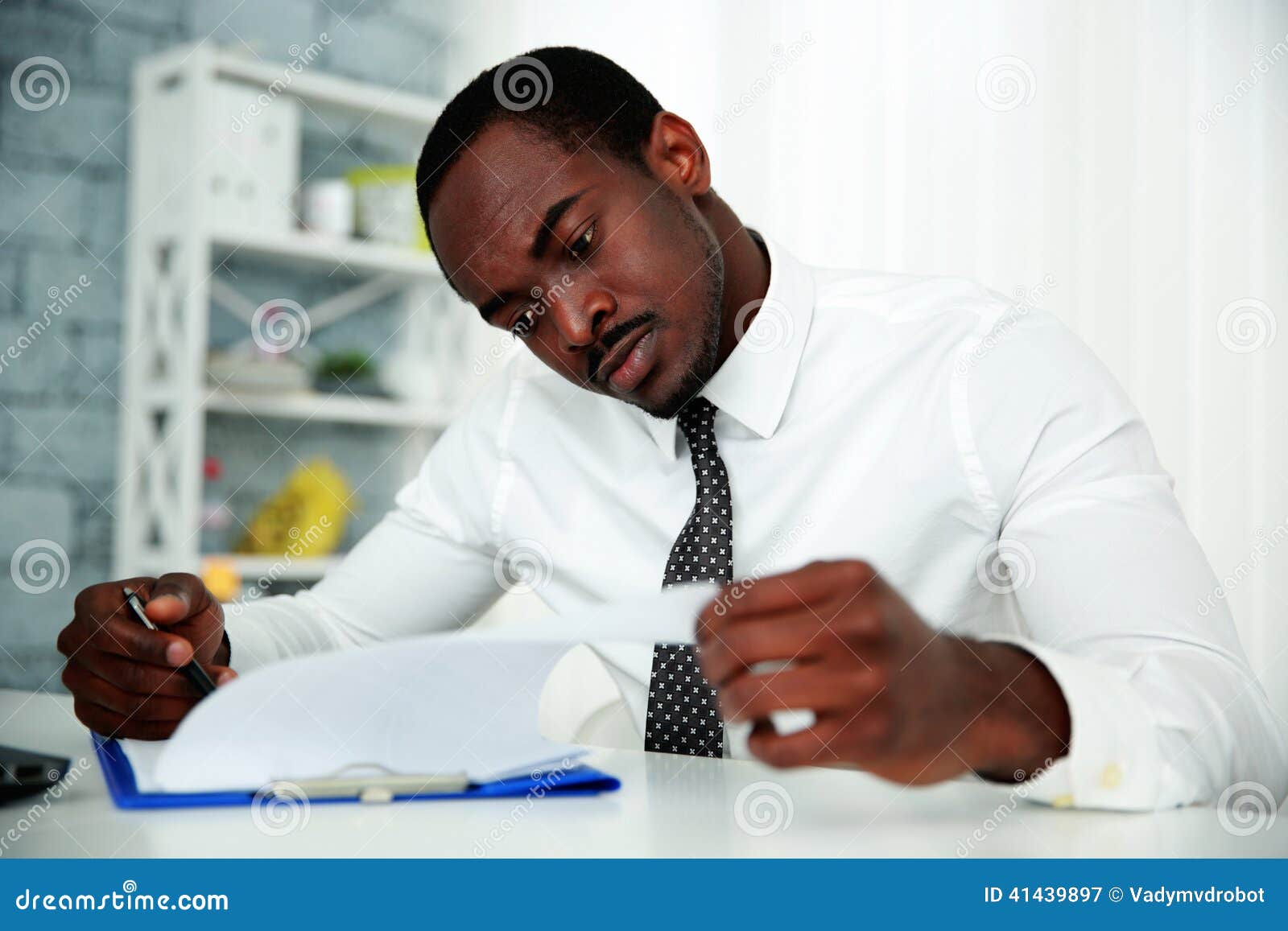 African Man Reading Document Stock Image - Image of paperwork ...