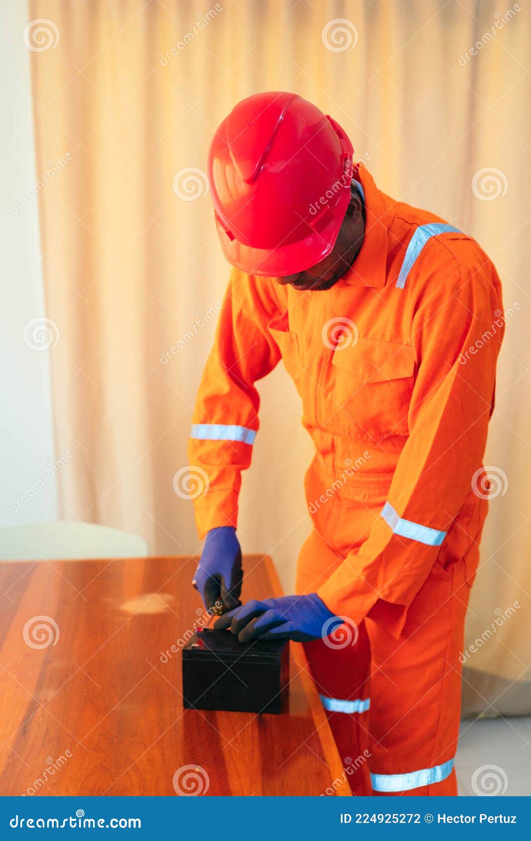 African Man is Repairing a Battery at Home Stock Photo - Image of ...