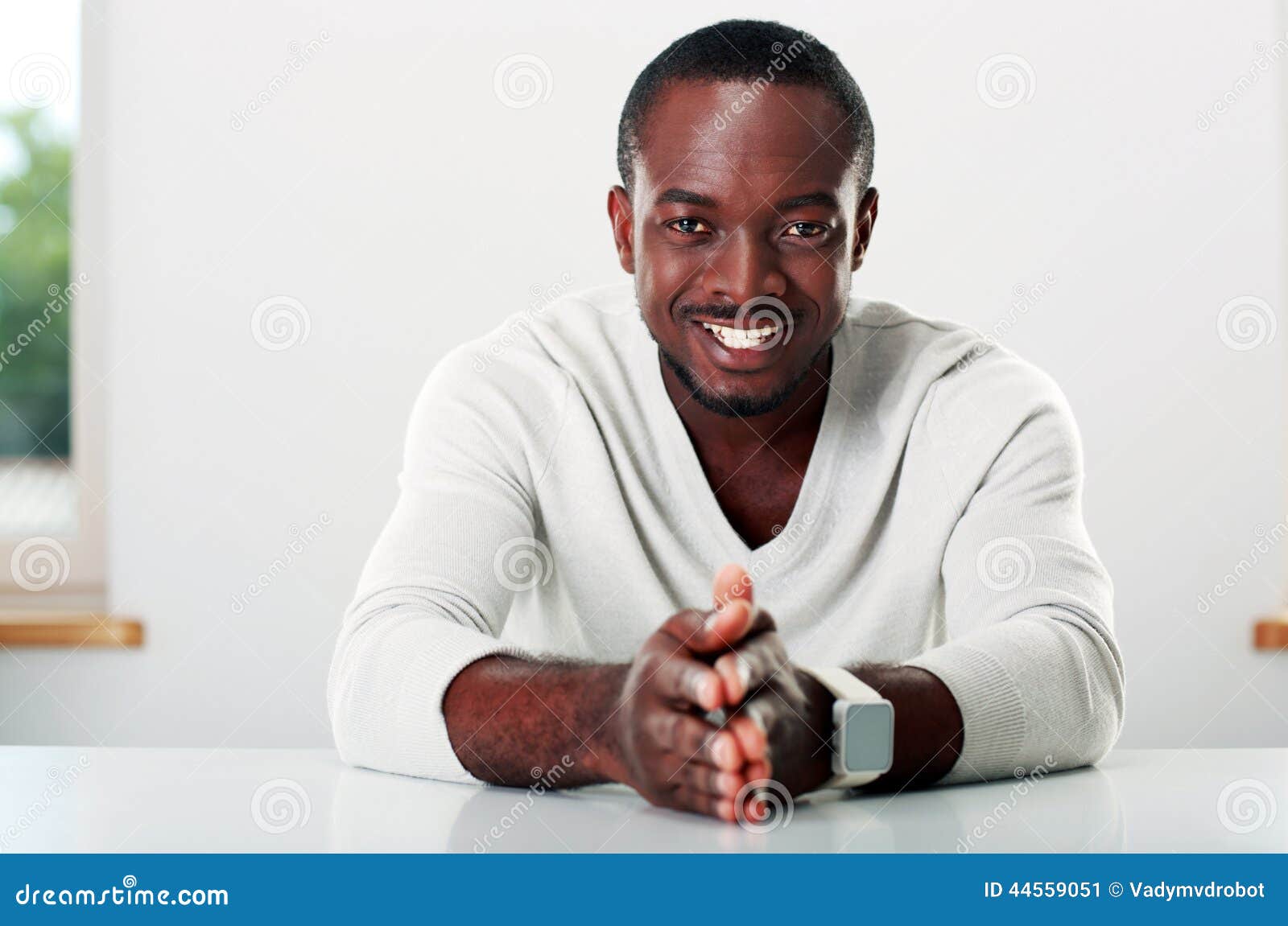 African Man Sitting at the Table Stock Image - Image of attractive ...