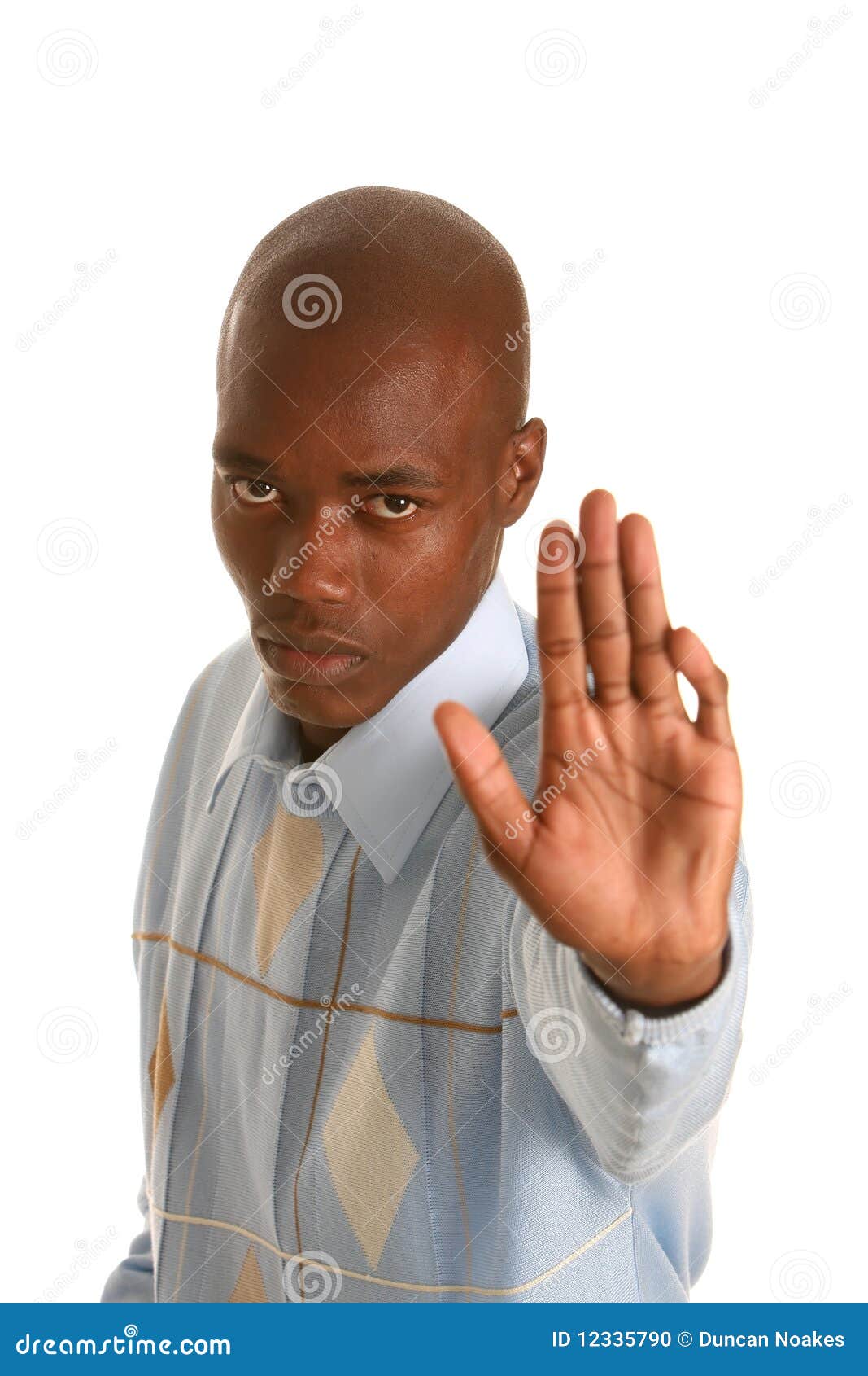 African Man Stop Sign stock photo. Image of entry, human - 12335790