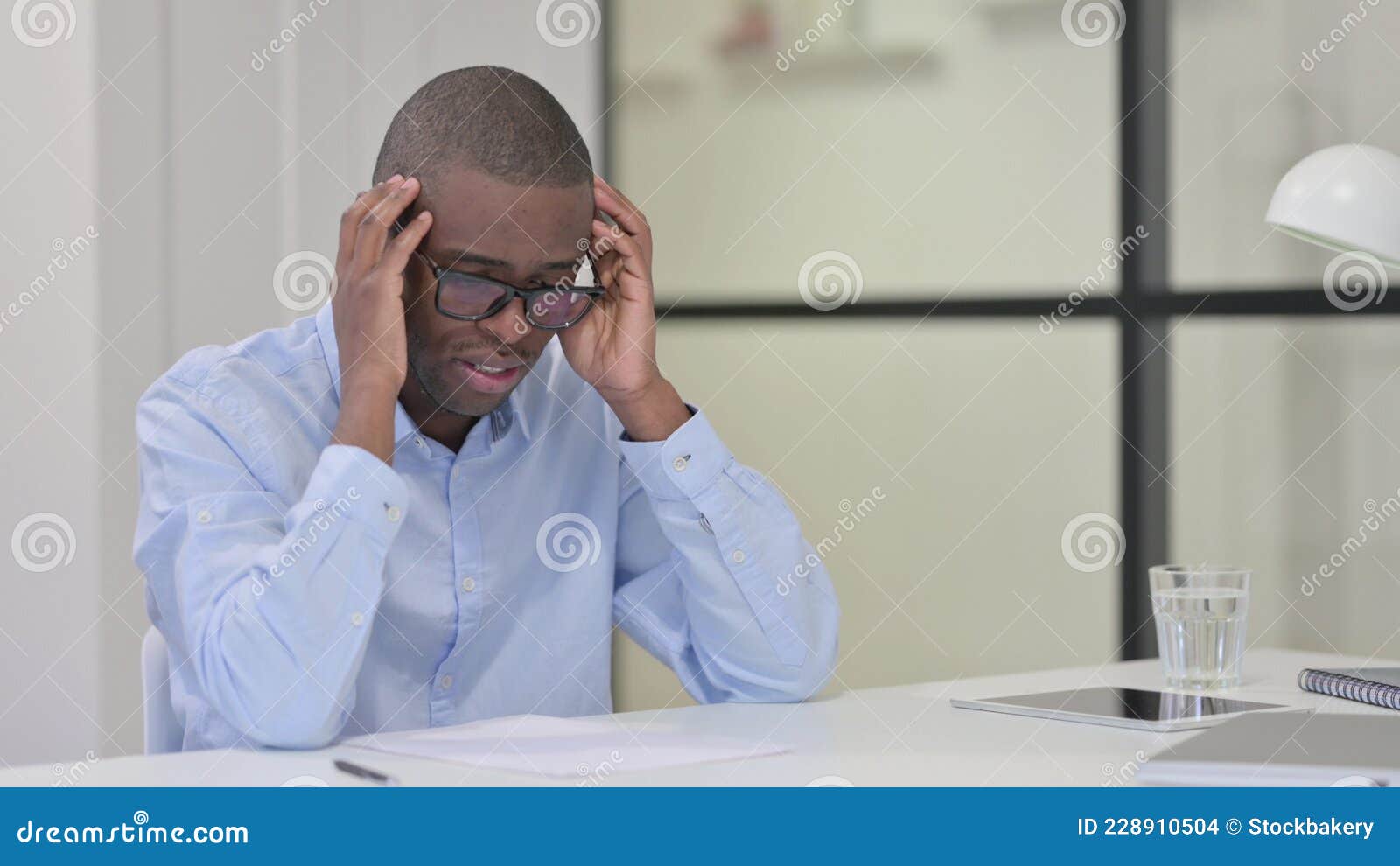 African Man Unable To Write at Work Stock Photo - Image of problems ...