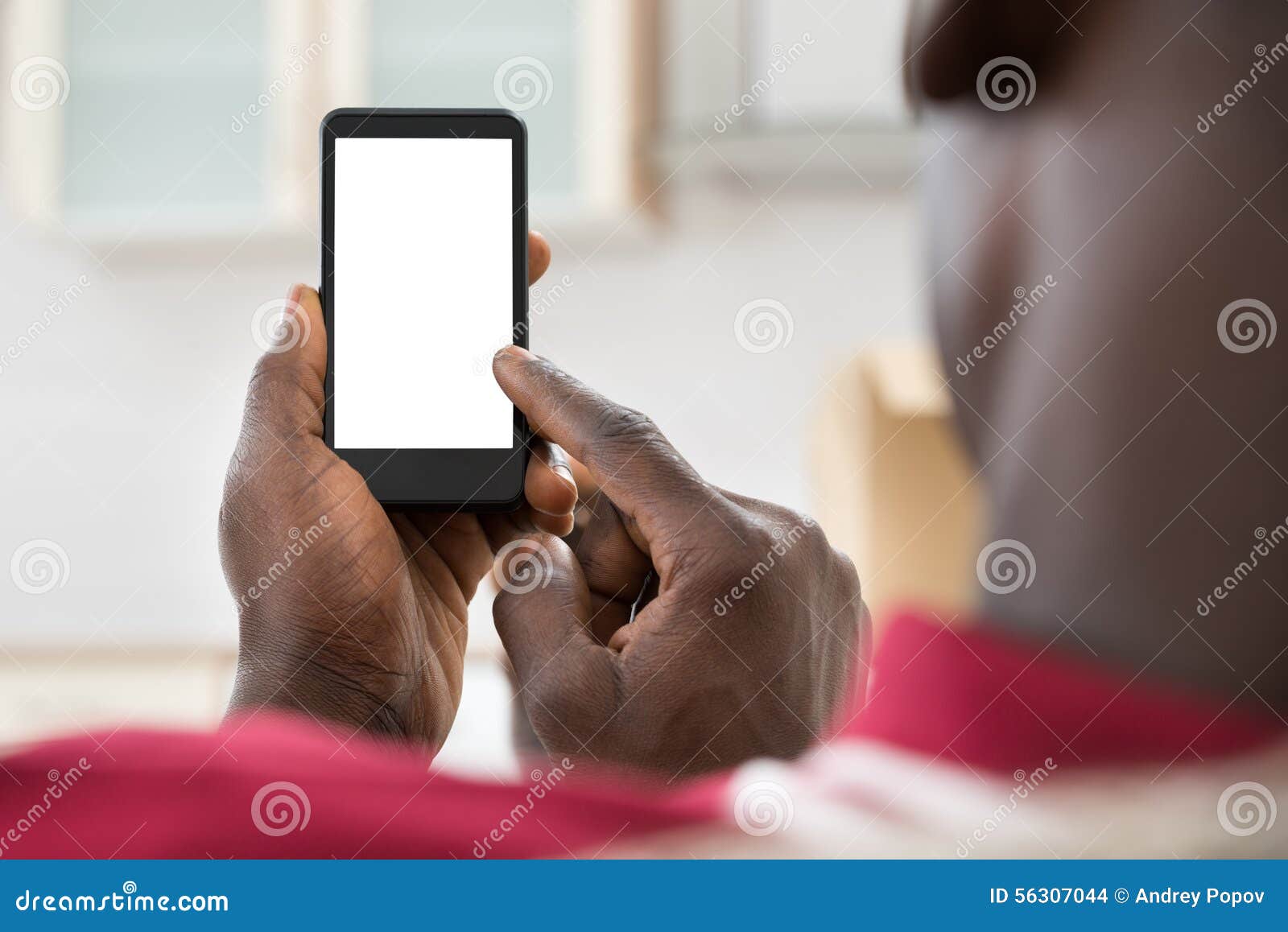 African Man Using Cellphone Stock Photo - Image of holding, hand: 56307044