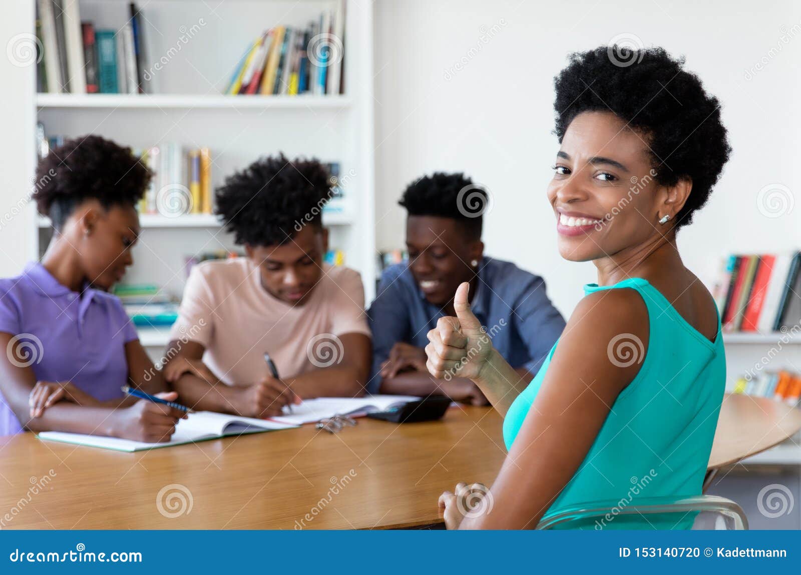African Mature Tutor with Students at Work Stock Photo - Image of ...