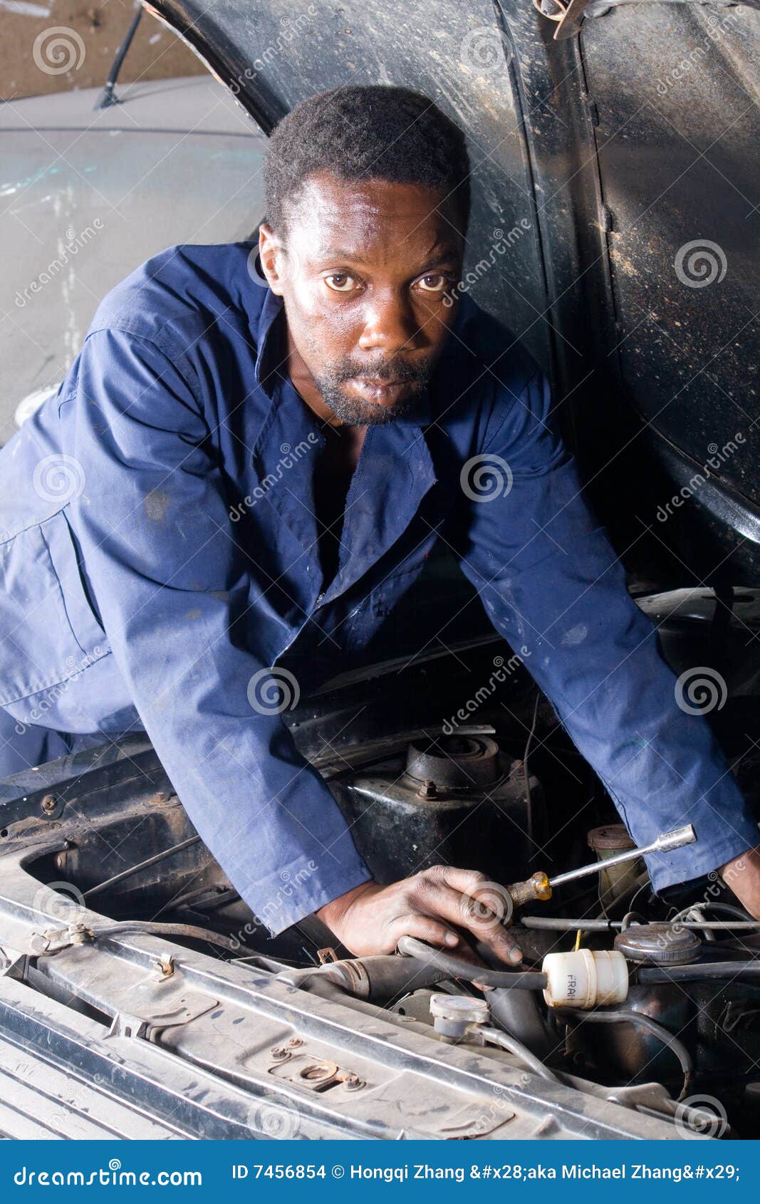 African mechanic at work stock photo. Image of beater - 7456854