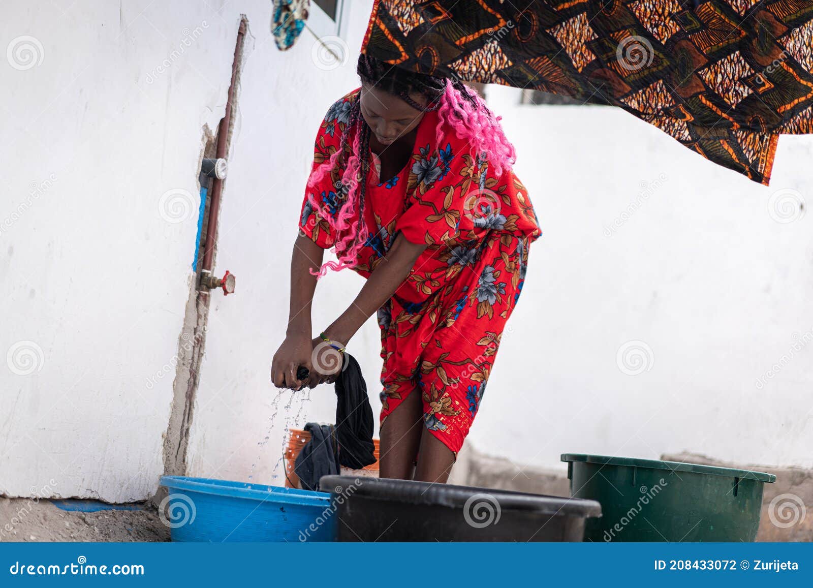 African Woman Hand Washing a Laundry Outdoors Stock Photo - Image of ...