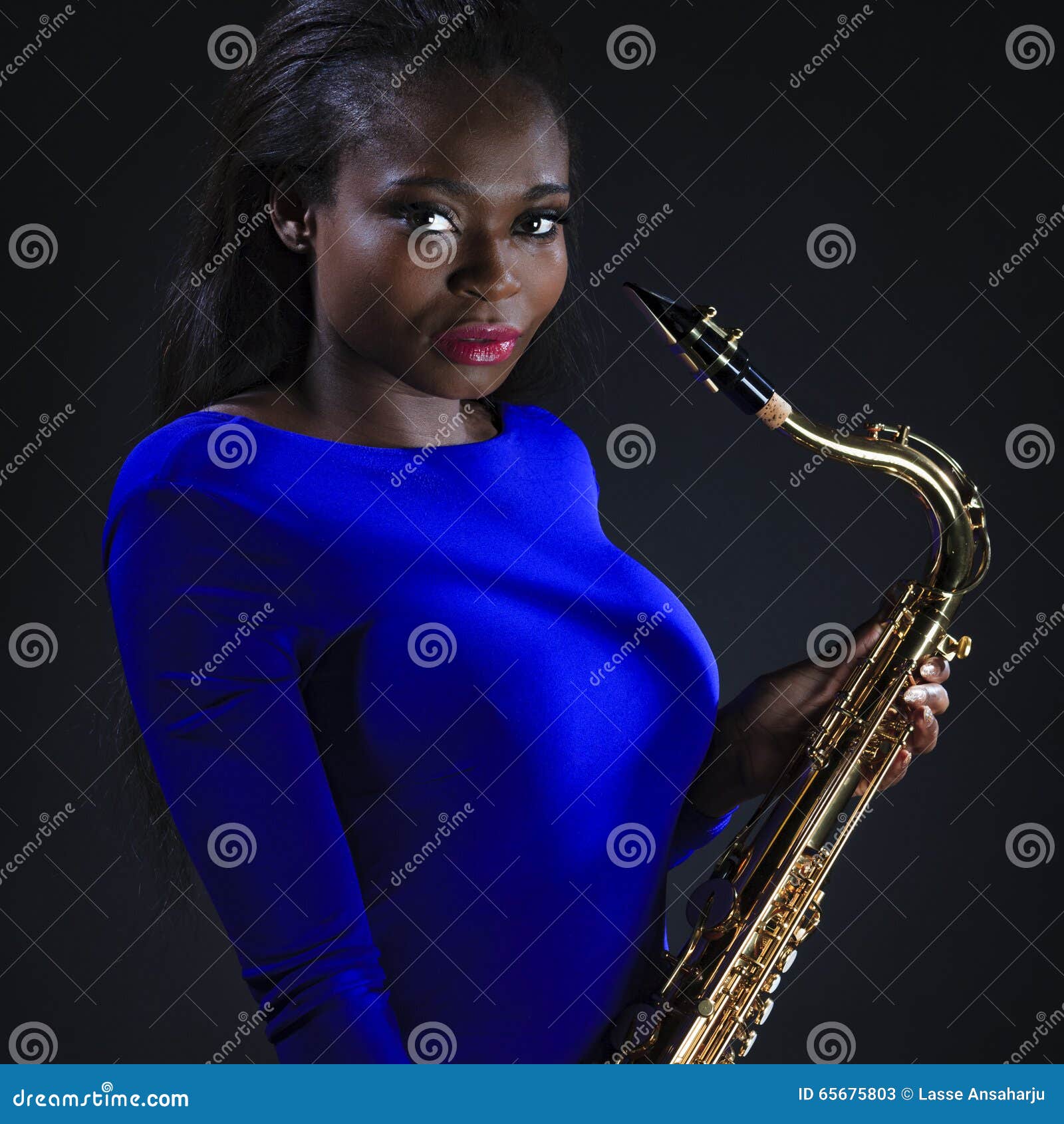 African Sax Lady stock image. Image of studio, dress - 65675803