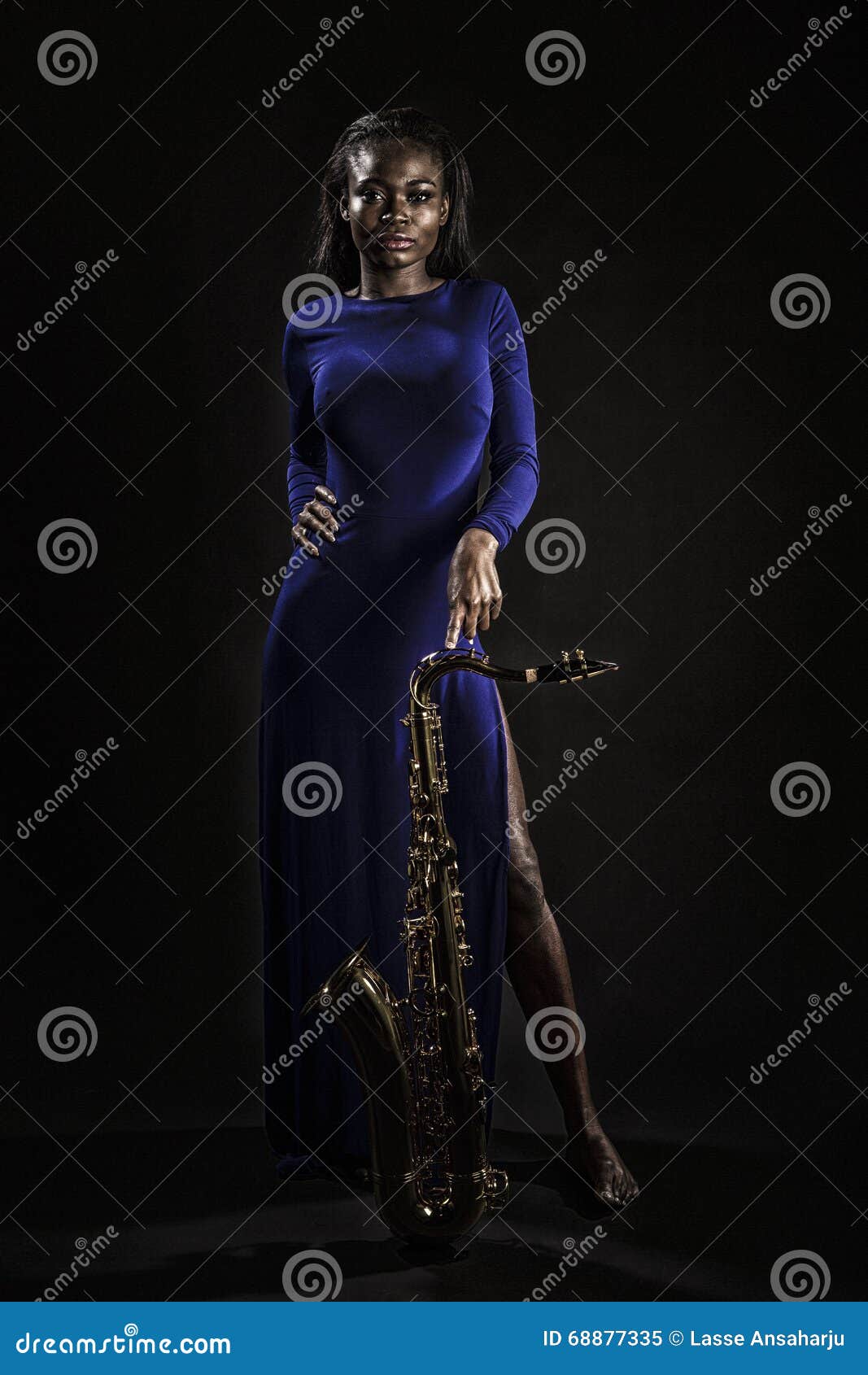 African Sax Lady stock image. Image of young, dress, woman - 68877335