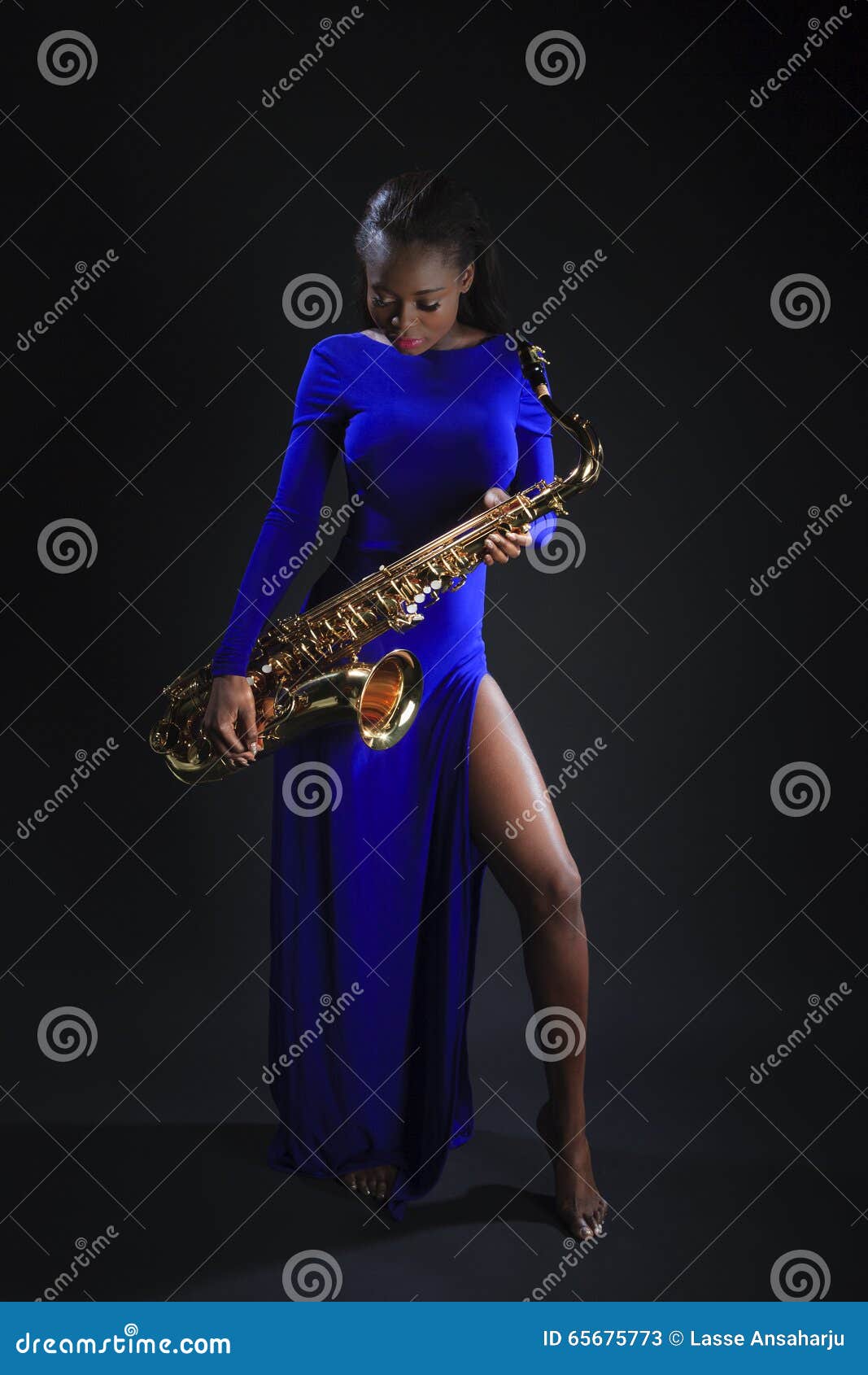African Sax Lady stock image. Image of saxophone, female - 65675773