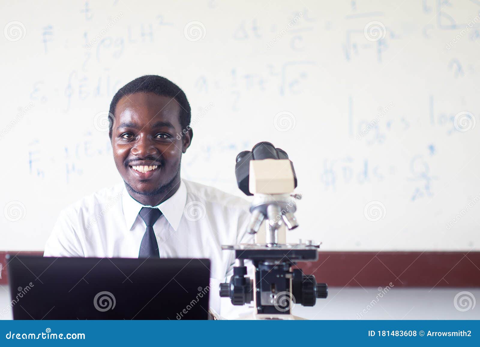 African Science Teacher Teaching and Smiling in the Stem Class with ...