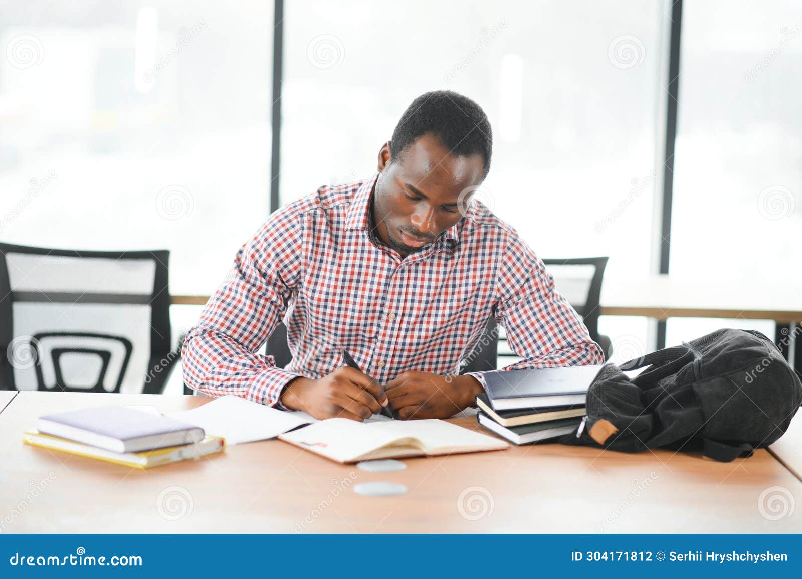 African Student Sitting in Classroom. Male Student during the Lecture ...
